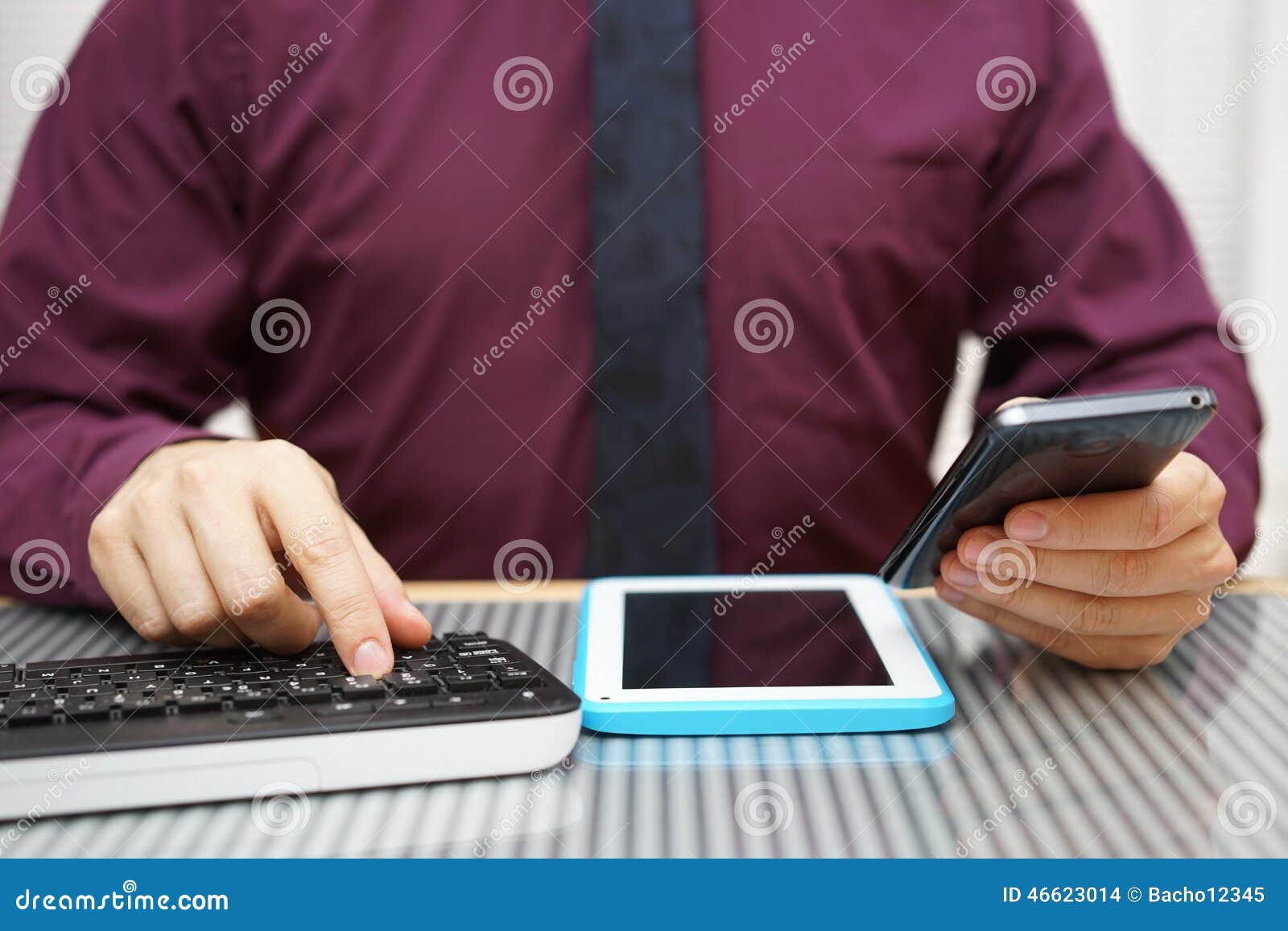 Busy Businessman is Working on Computer, Tablet and Mobile Phone Stock ...
