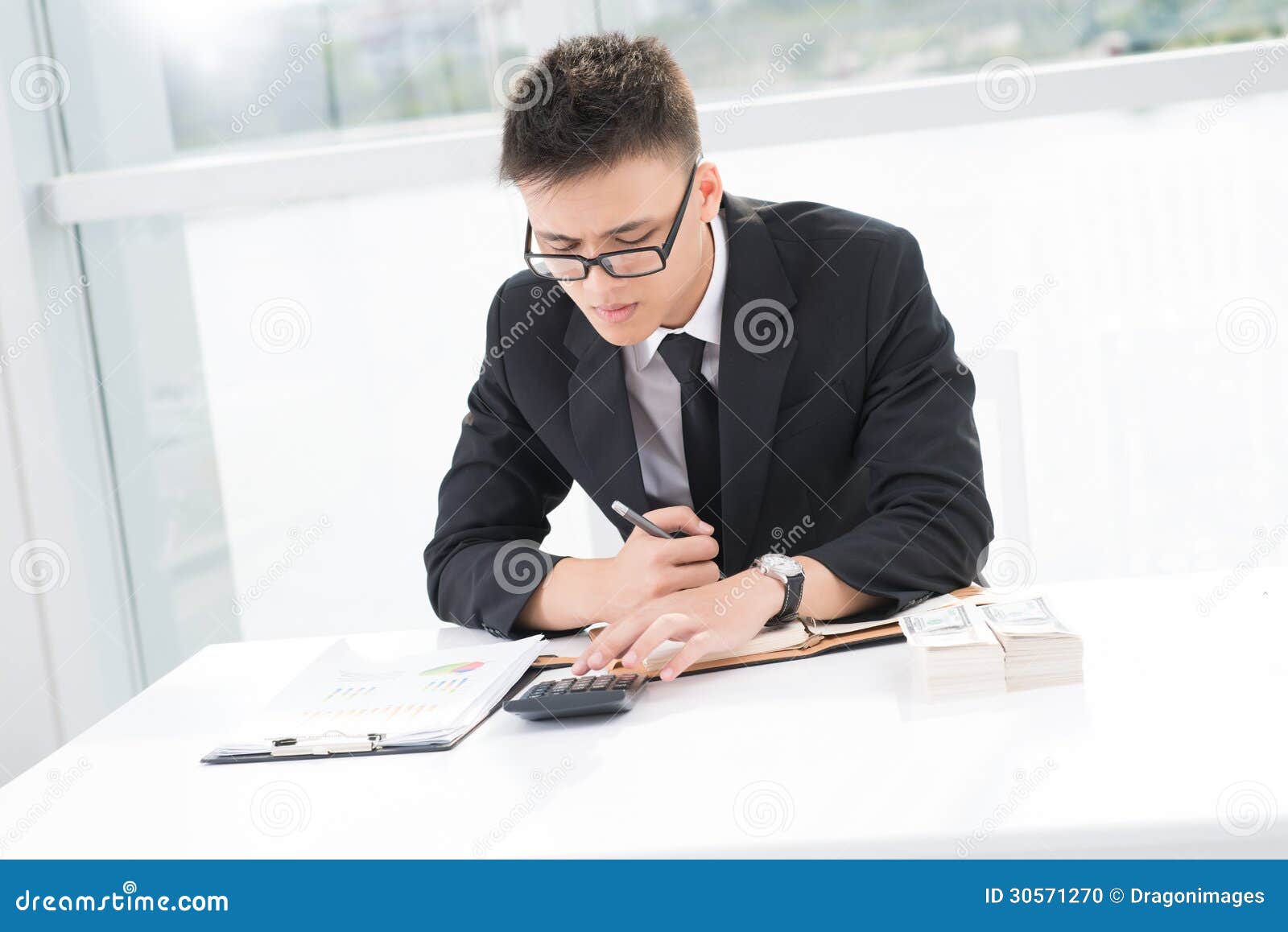 Busy businessman stock photo. Image of calculator, collar - 30571270