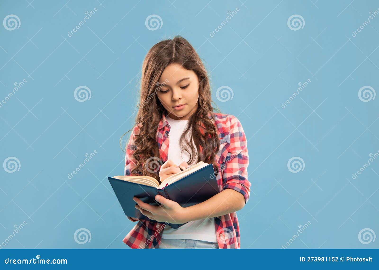 Busy Child Making Notes on Blue Background, Knowledge Stock Photo ...