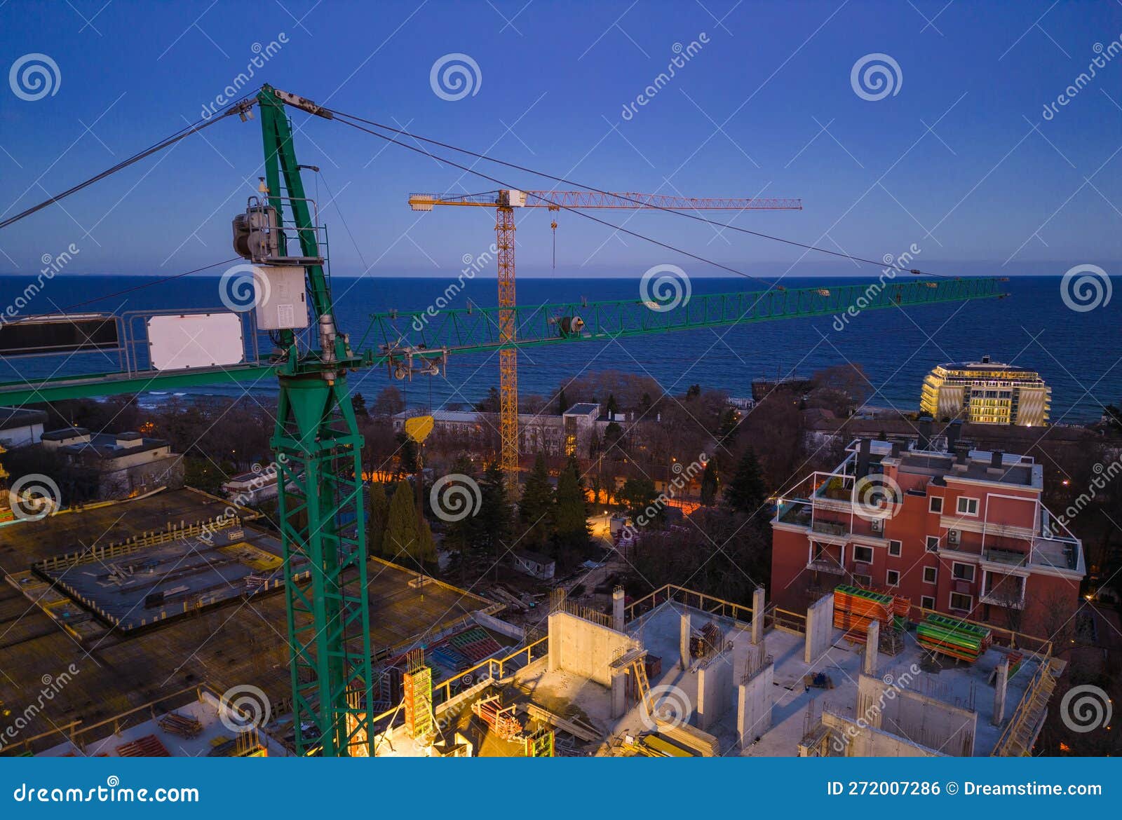 Busy Construction Site and Construction Equipment at Night. Aerial View ...