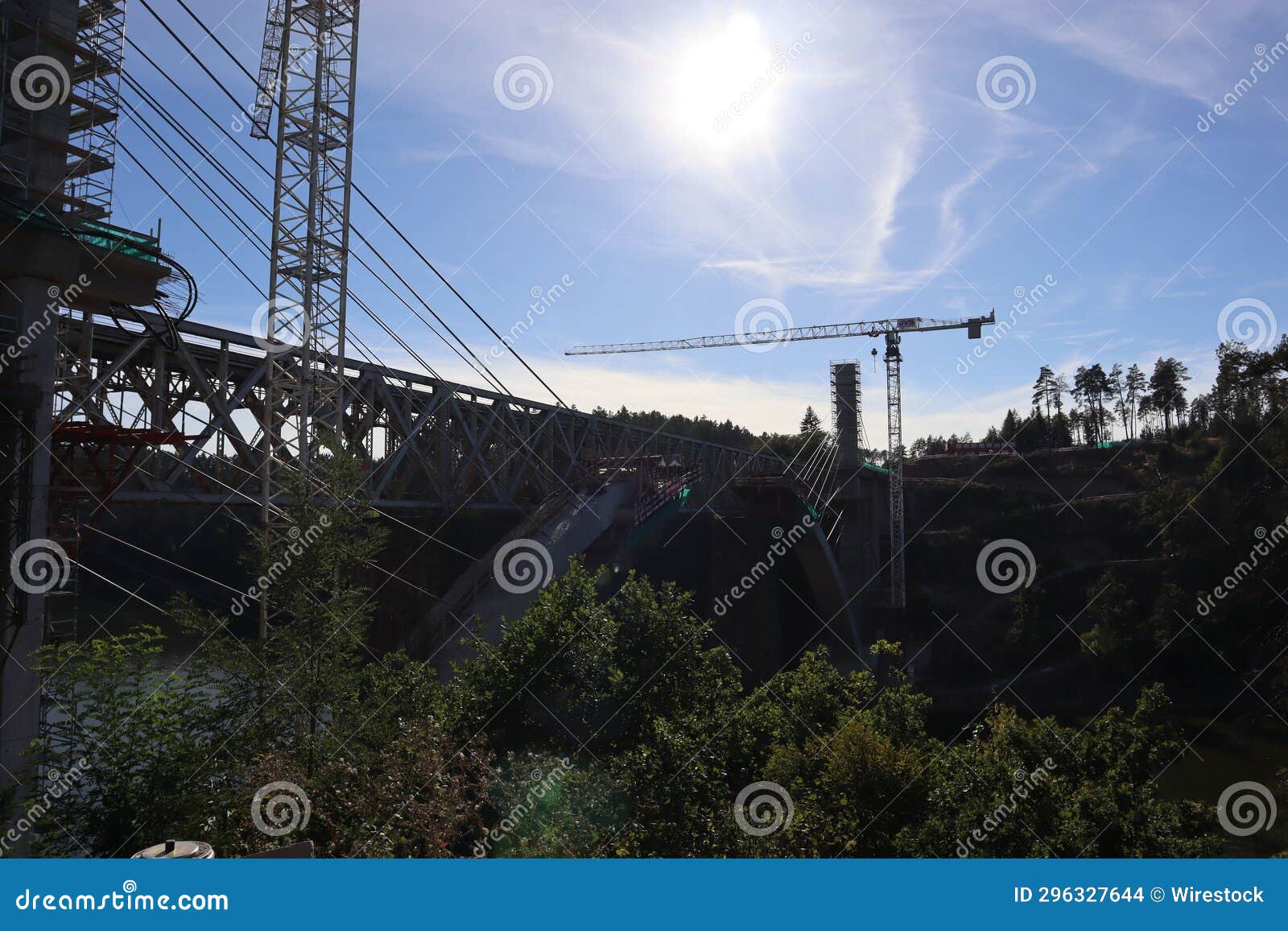 Busy Construction Site with Multiple Large Cranes Working in Tandem To ...
