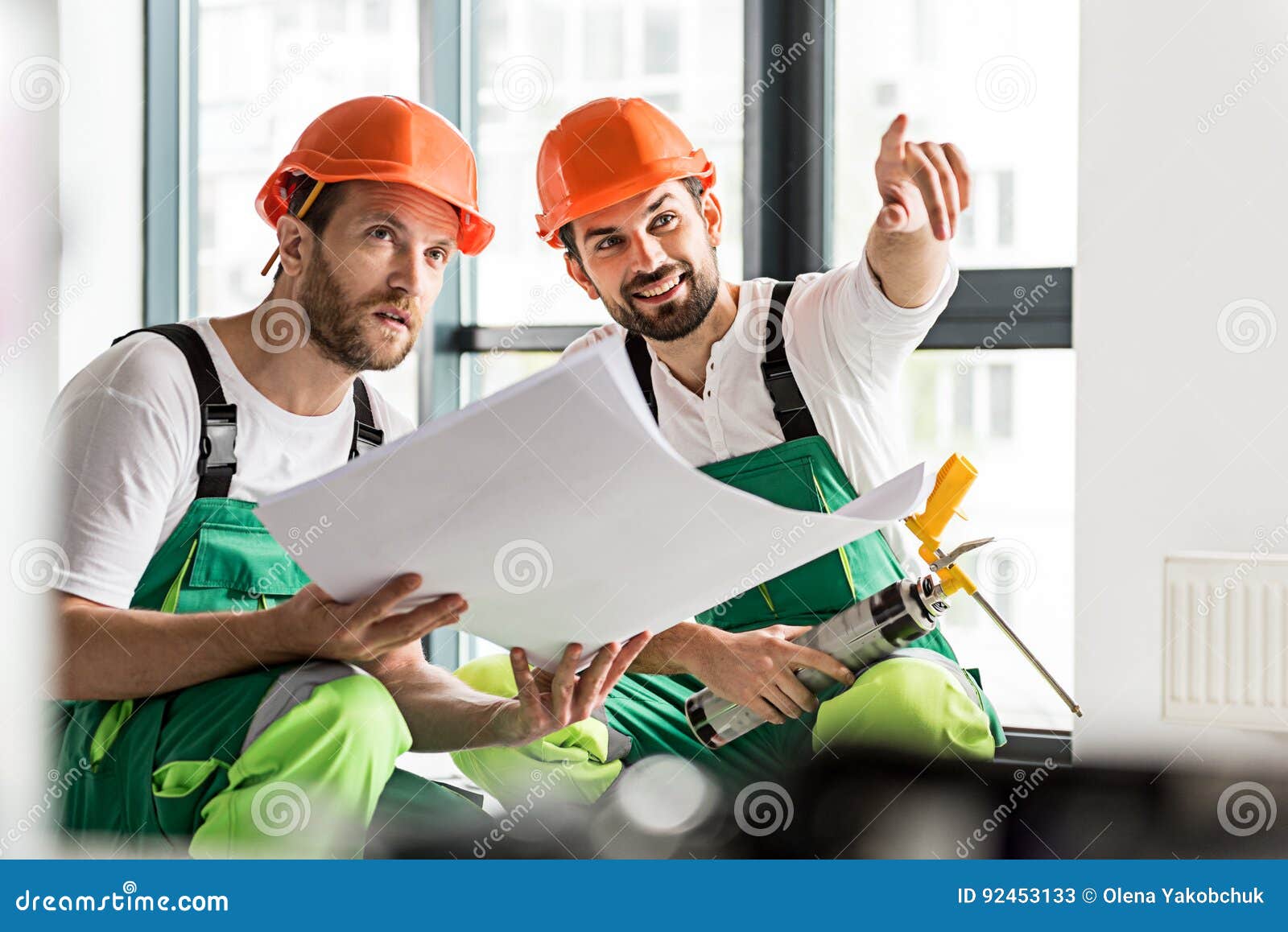 Busy Constructors Discussing Plan for Work Stock Image - Image of adult ...