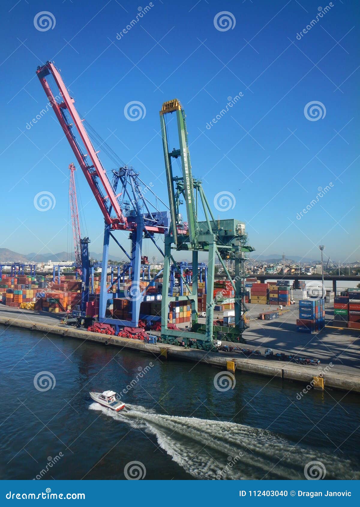 Busy Container Terminal with Two Cargo Cranes Waiting for Operation ...