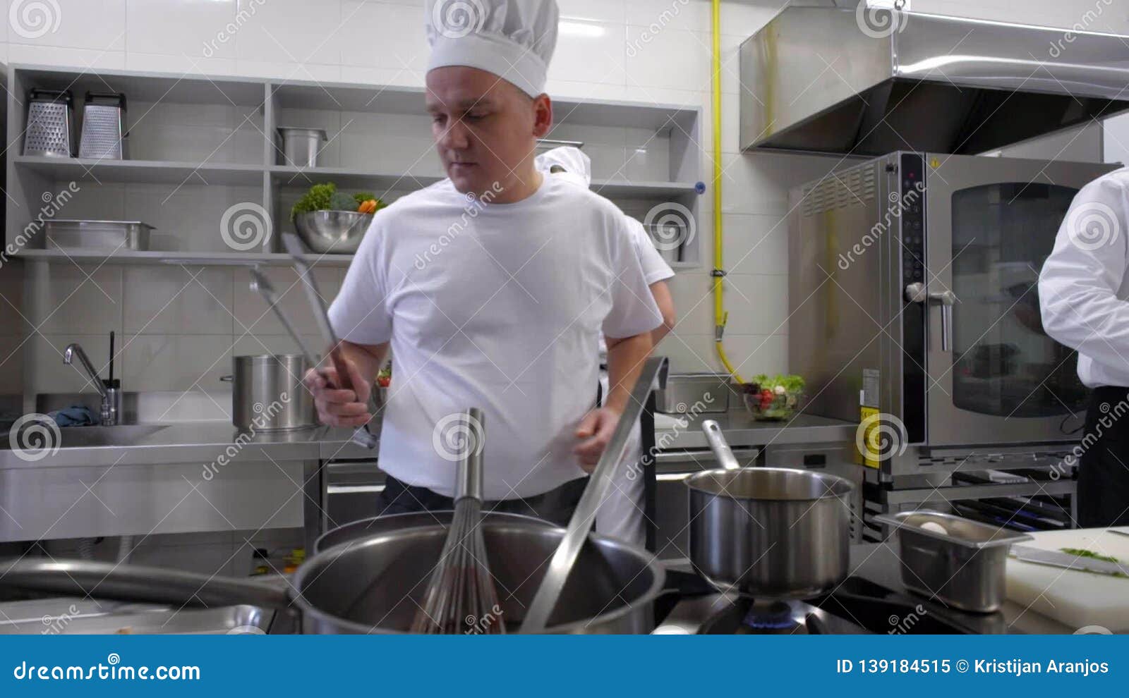 Busy Cooks and Kitchen Chef Working in Professional Kitchen Stock Video ...