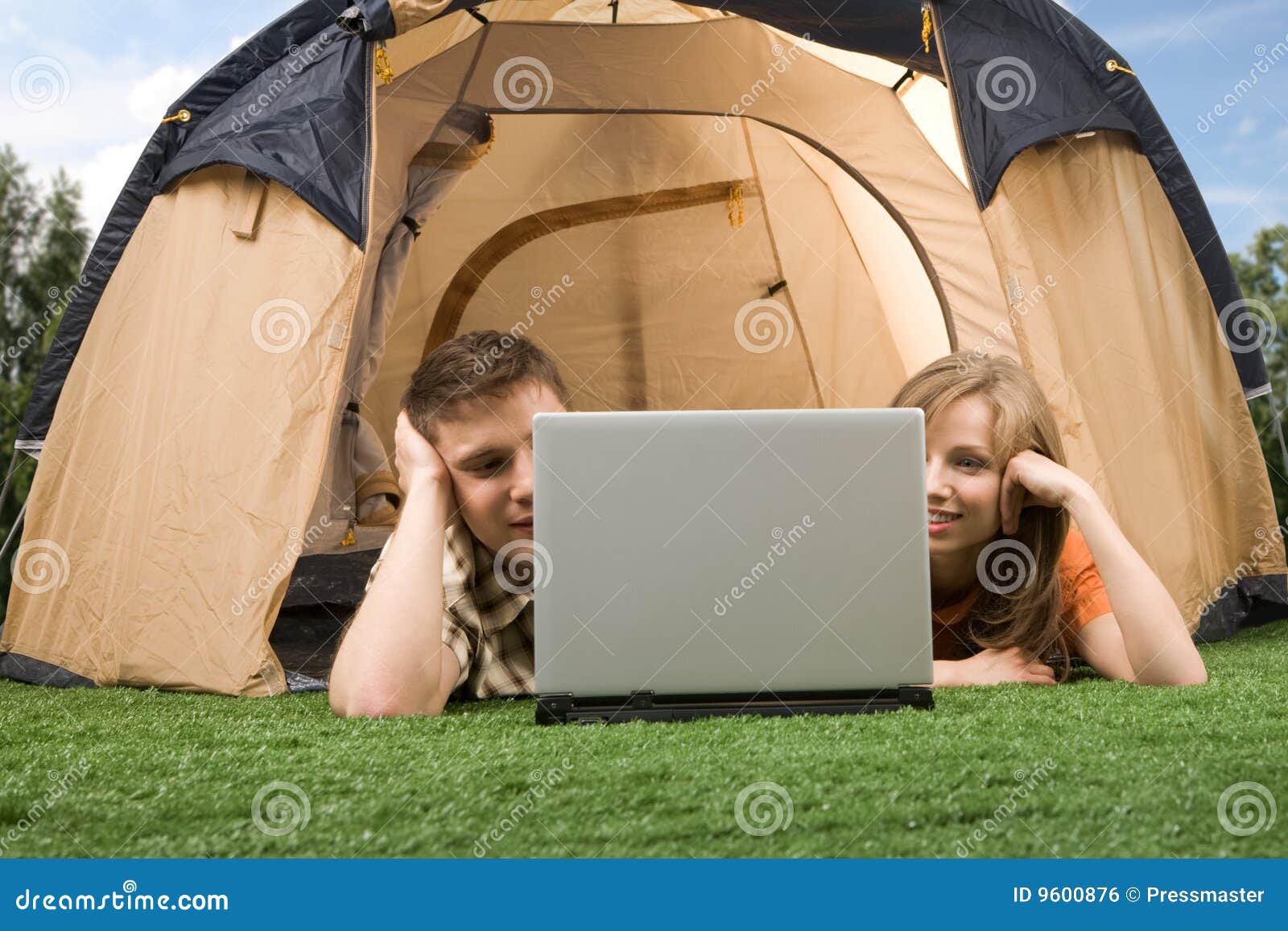 Busy couple stock photo. Image of relaxing, green, computer - 9600876