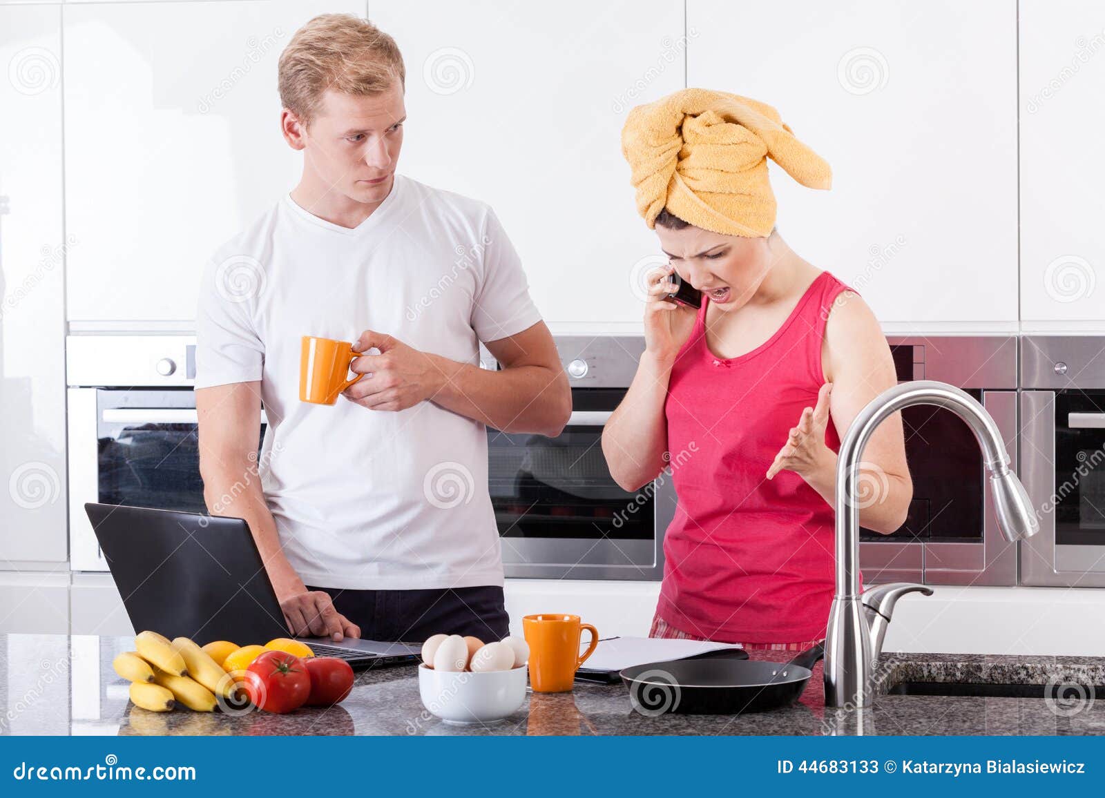 Busy Couple in the Morning in Kitchen Stock Image - Image of husband ...