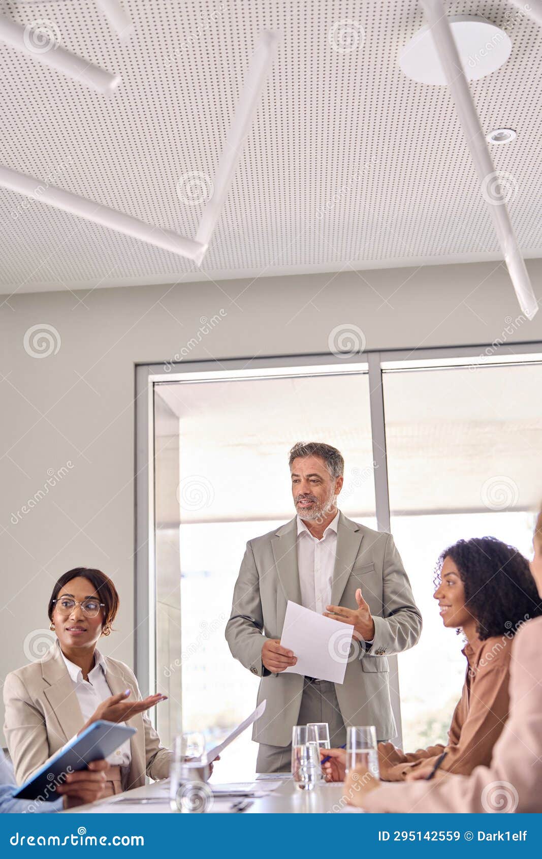 Busy Diverse Executive Team with Leader Discussing Work at Meeting ...