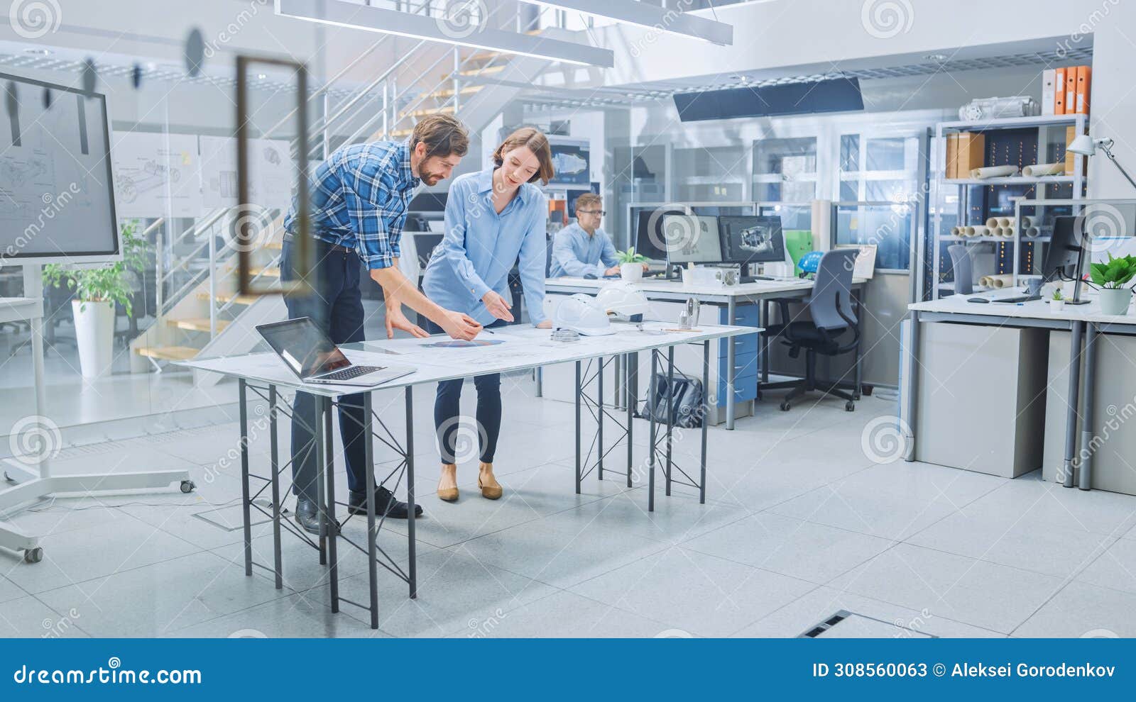 In the Busy Engineering Facility: Diverse Group of Engineers ...