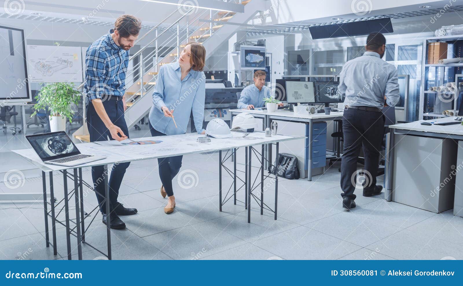 In the Busy Engineering Facility: Diverse Group of Engineers ...