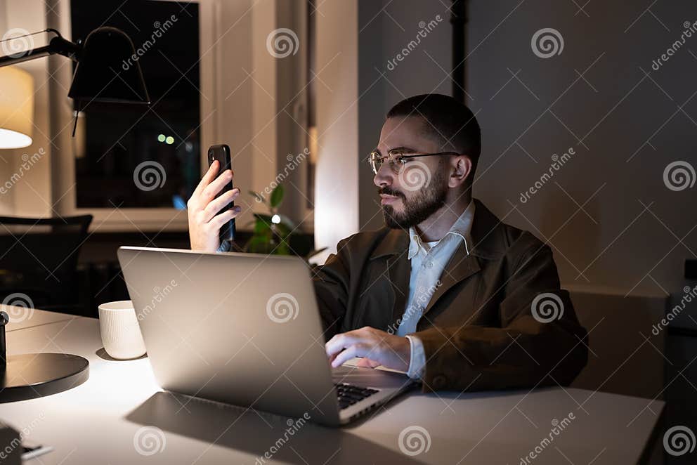 Busy Front End Developer or Qa Engineer Testing App on Smartphone Work ...