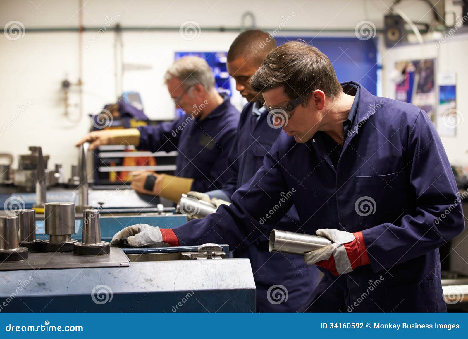 Busy Interior of Engineering Workshop Stock Photo - Image of person, apprentice: 34160592