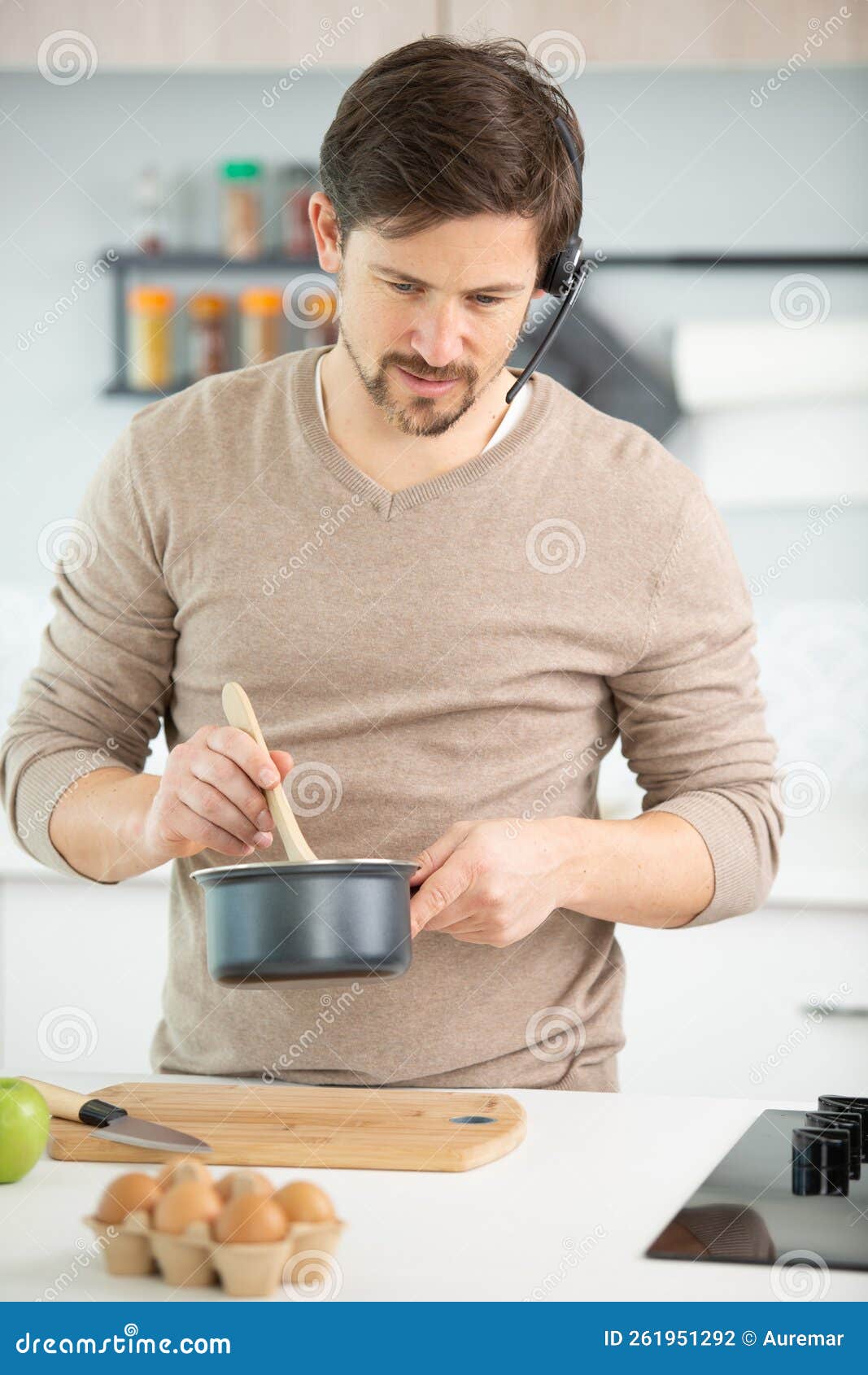 Busy Man Cooking and Working at Same Time Stock Photo - Image of ...