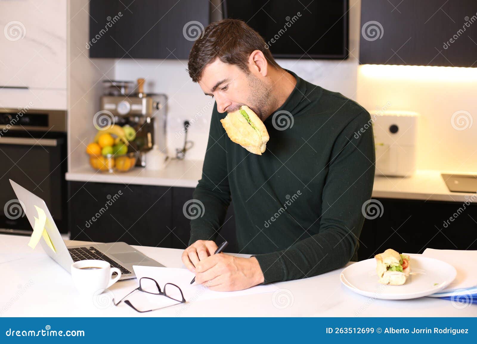 Busy Man Eating a Sandwich while on Conference Call Stock Image - Image ...
