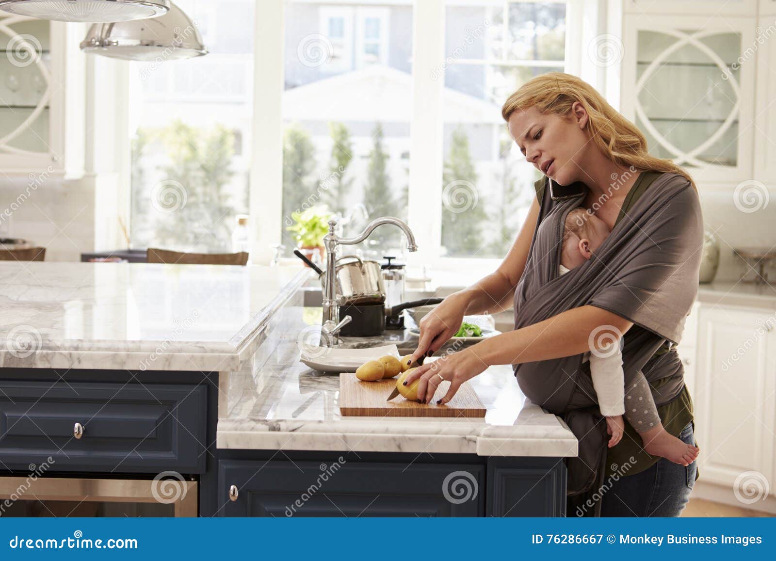 Busy Mother with Baby in Sling Multitasking at Home Stock Image - Image ...