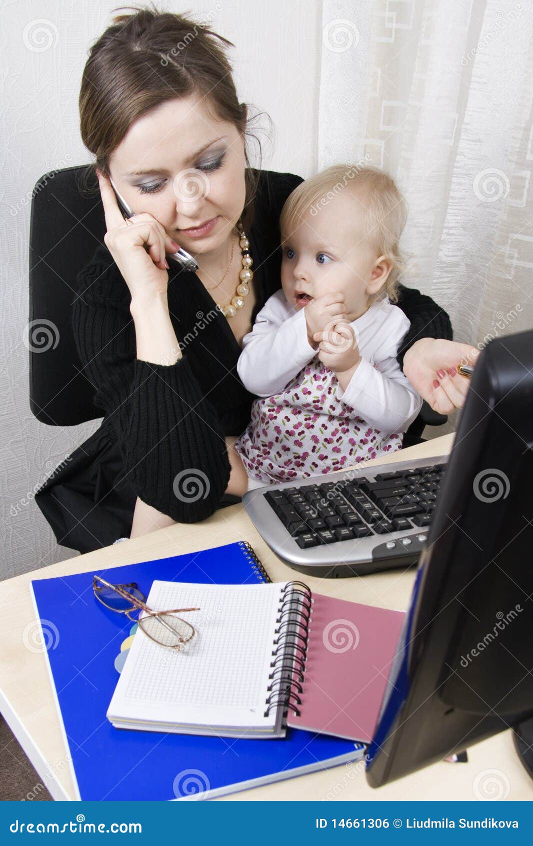 Busy mother with her baby stock photo. Image of simultaneously - 14661306