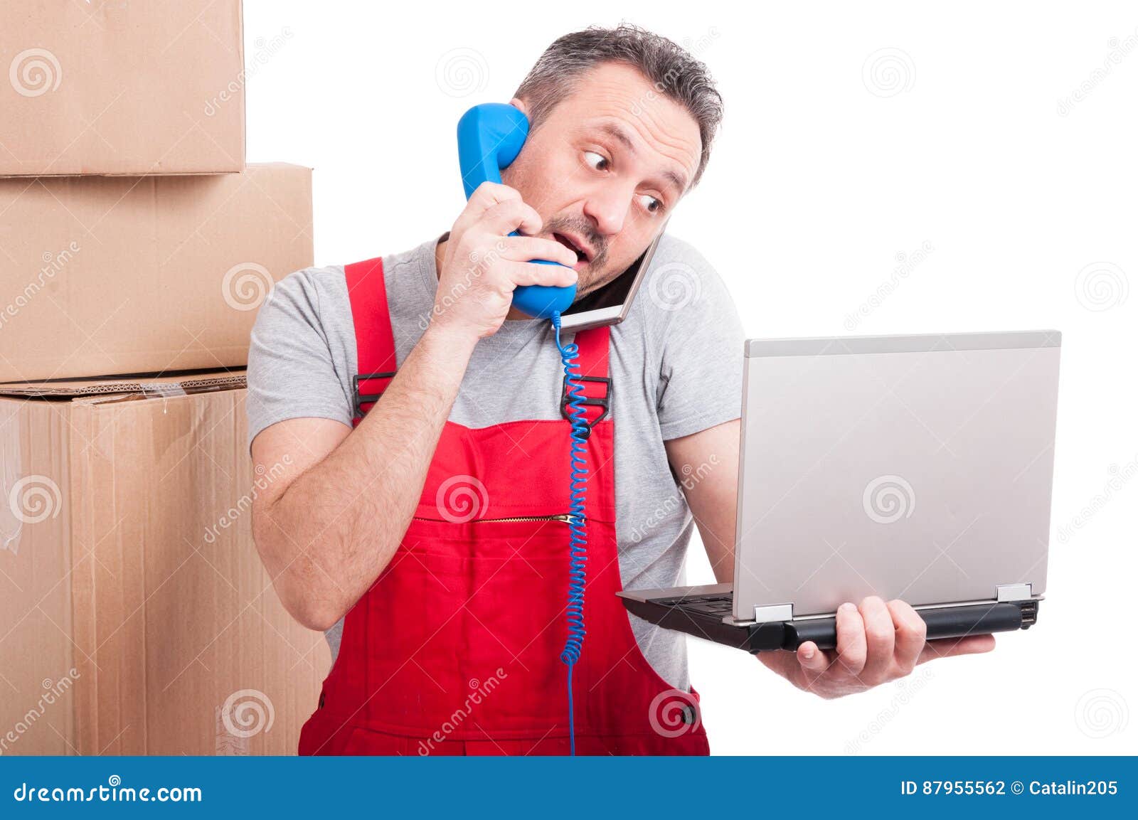 Busy Mover Guy Multitasking with Laptop and Phones Stock Photo - Image ...