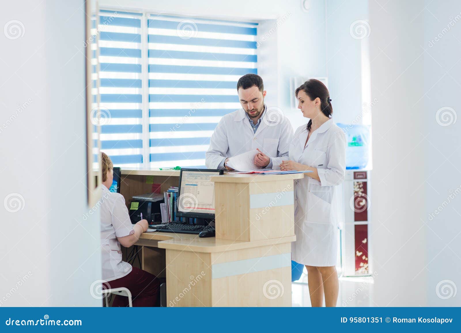 Busy Reception in a Hospital with Doctors and Receptionists Stock Image ...