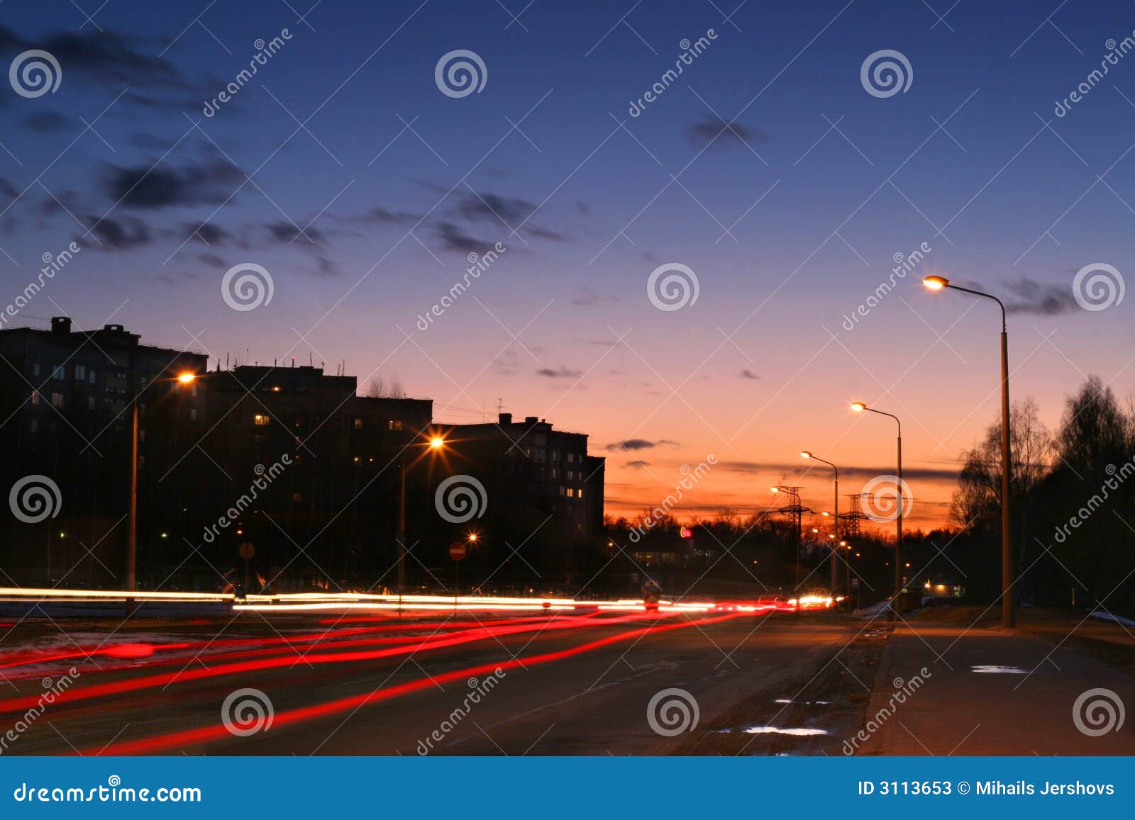 A busy road at sunset stock image. Image of curve, busy - 3113653