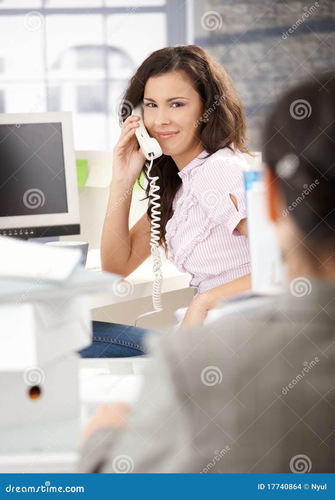 Busy Secretary Talking on Phone in Office Smiling Stock Photo - Image ...