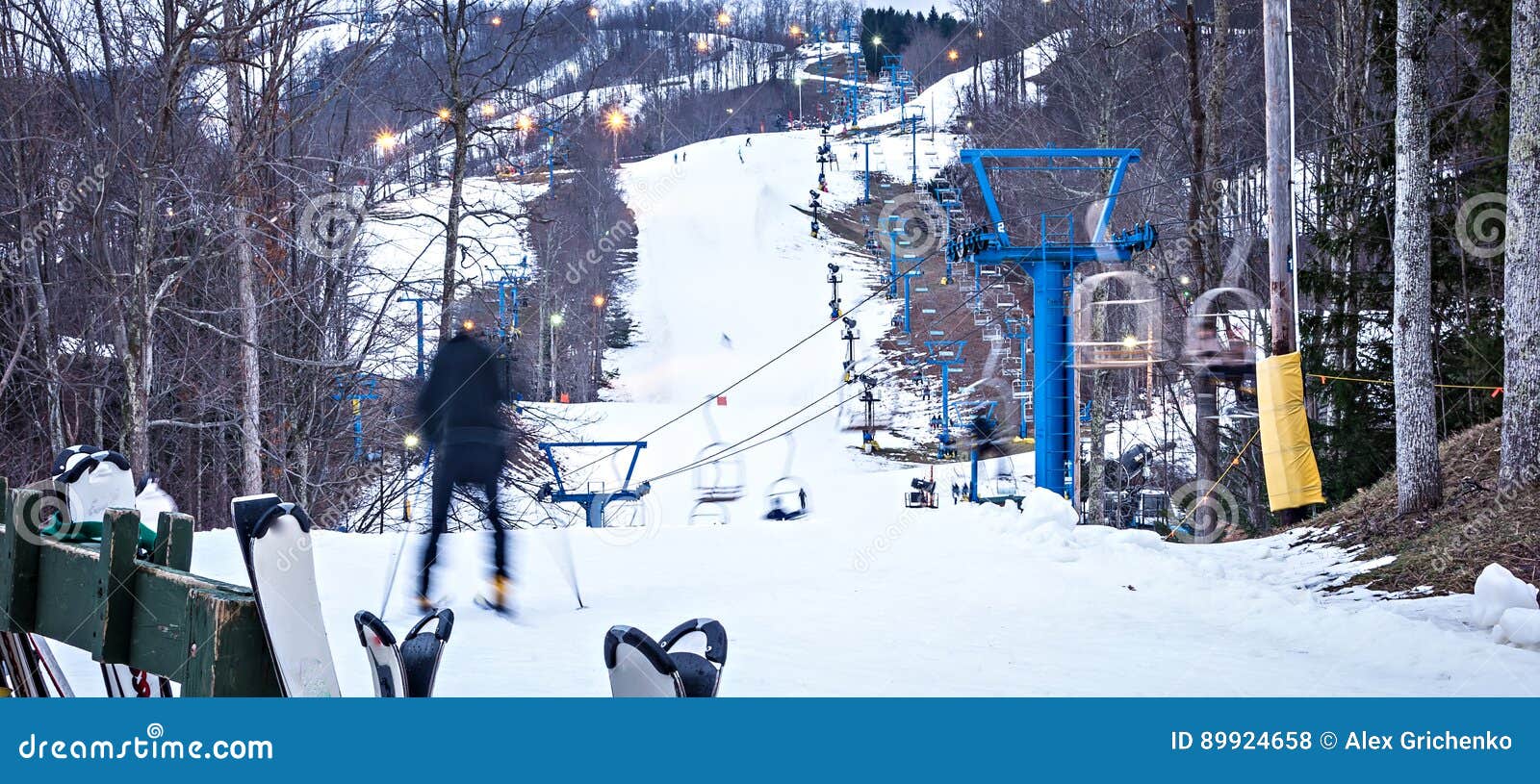 Busy Ski Resort with Open Evening Runs Stock Photo - Image of pylon ...