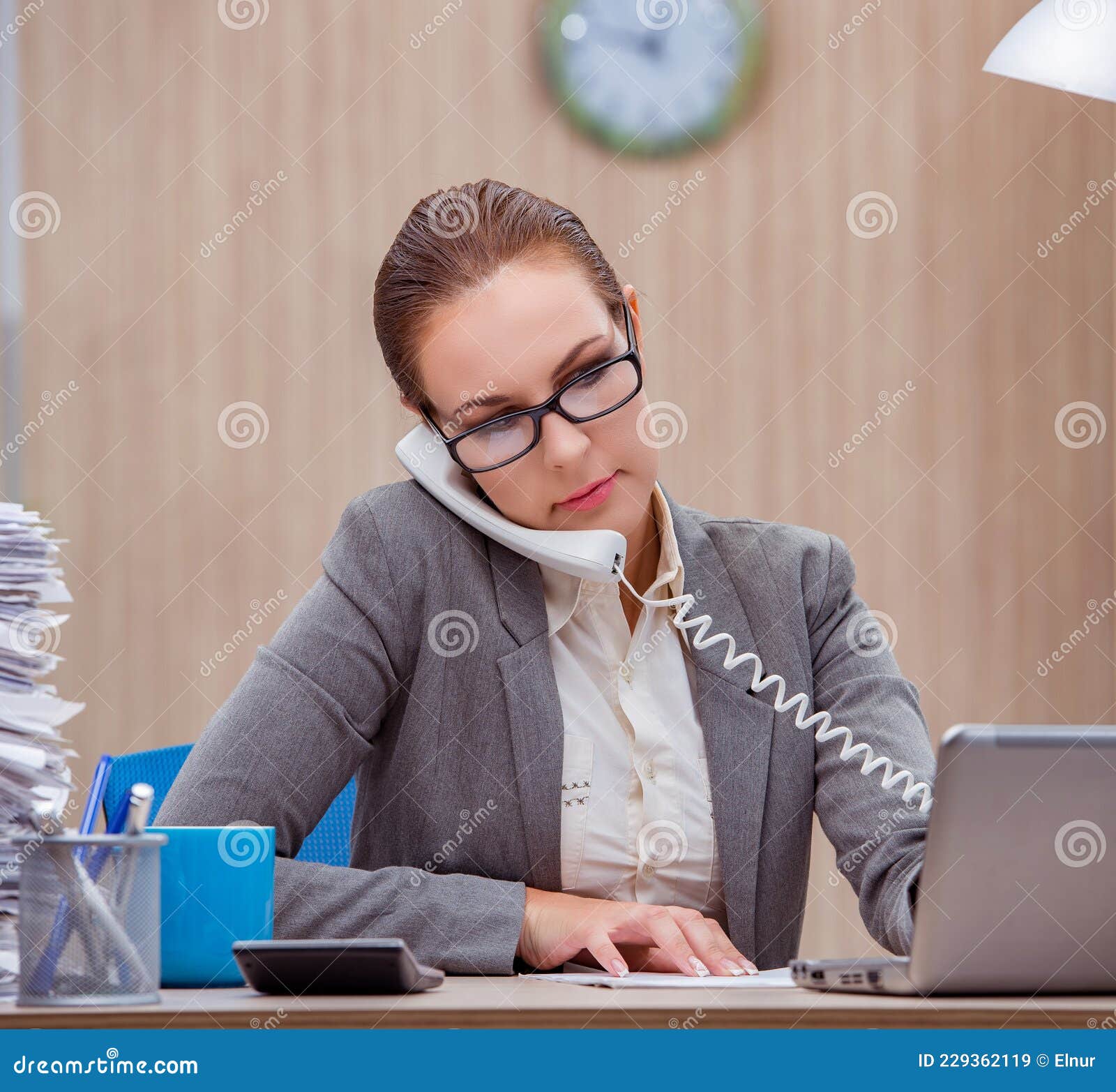 Busy Stressful Woman Secretary Under Stress In The Office Stock Image