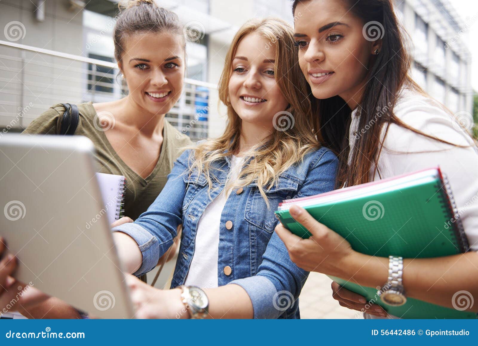 Busy students on campus stock photo. Image of knowledge - 56442486