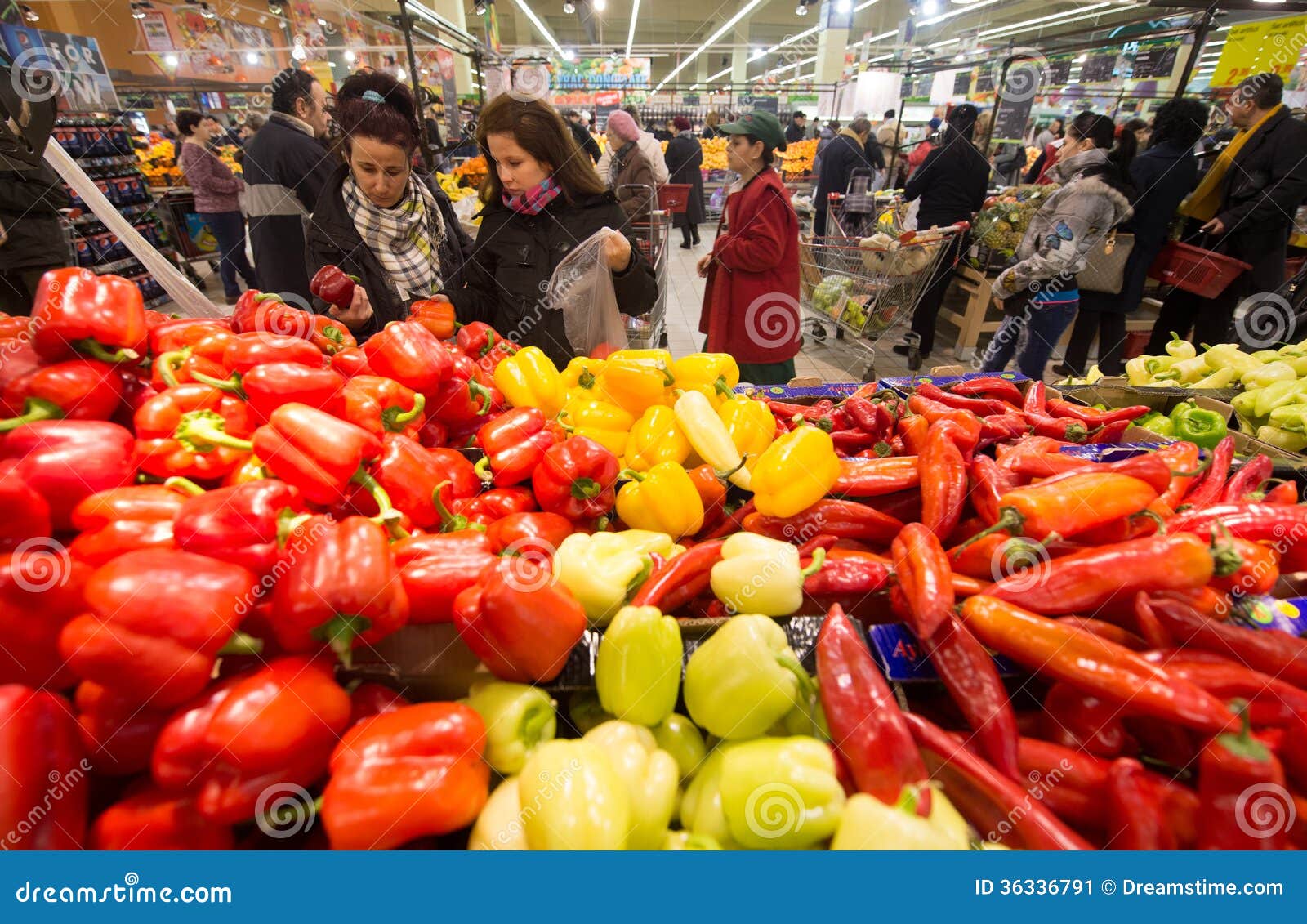 Busy supermarket editorial photo. Image of colorful, people - 36336791