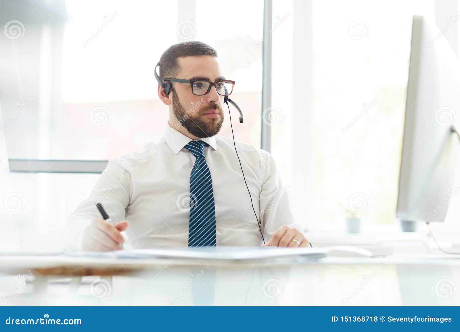 Busy Tech Support Manager Consulting on Website Issues Stock Photo ...