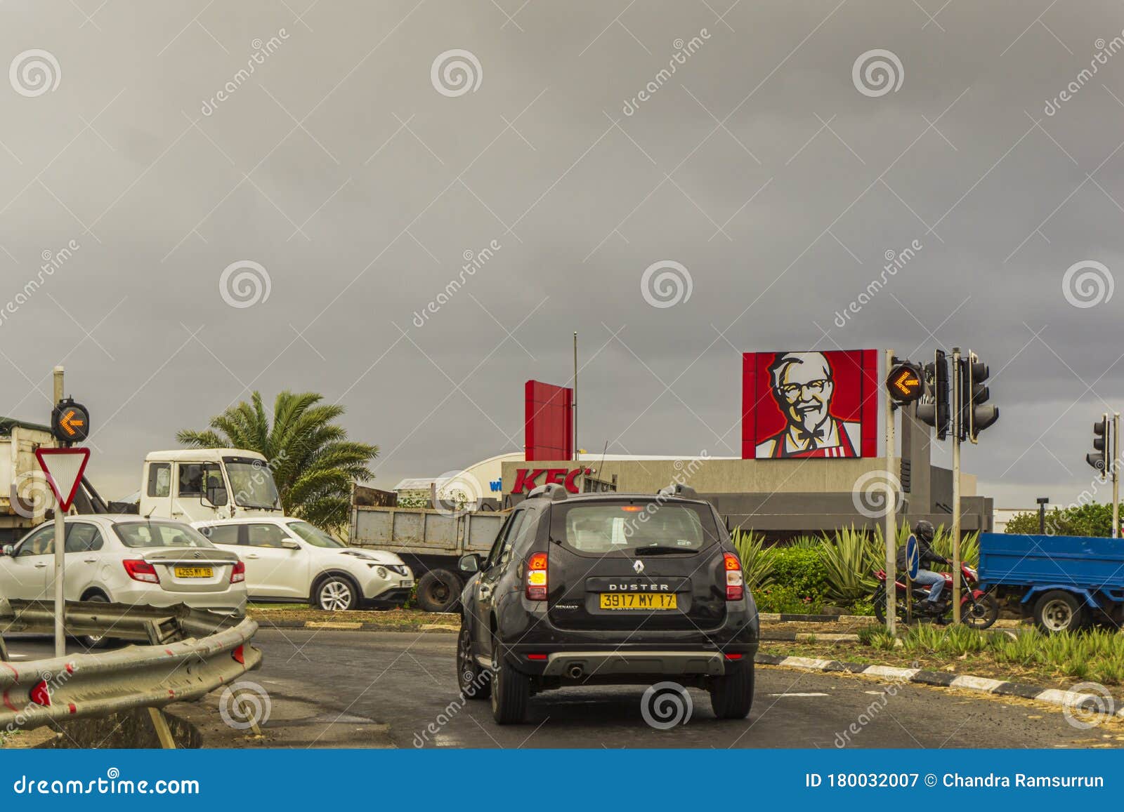 Busy traffic at KFC store editorial photography. Image of logo - 180032007