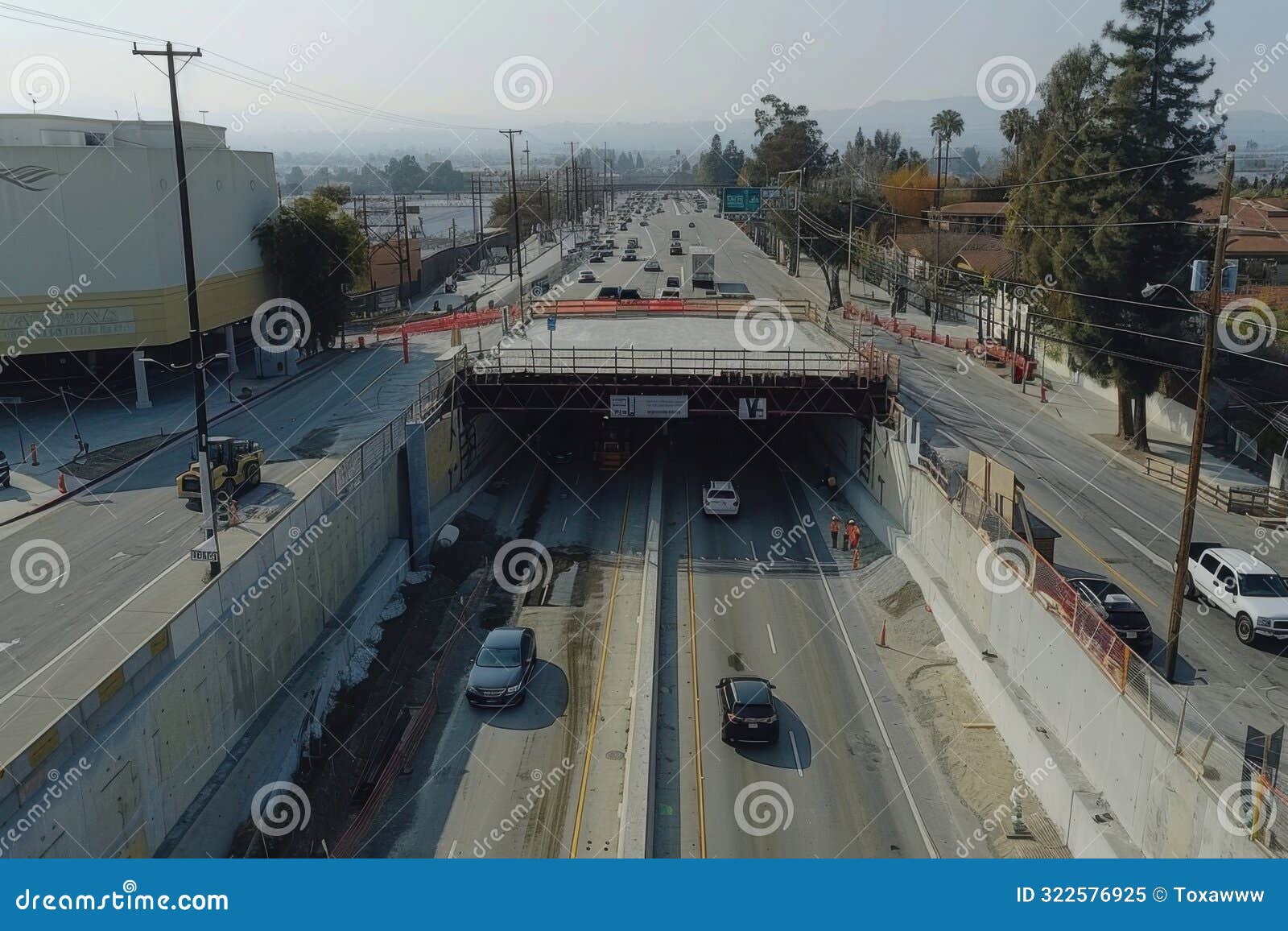 Urban Freeway Under Construction with Vehicles Passing through Stock ...