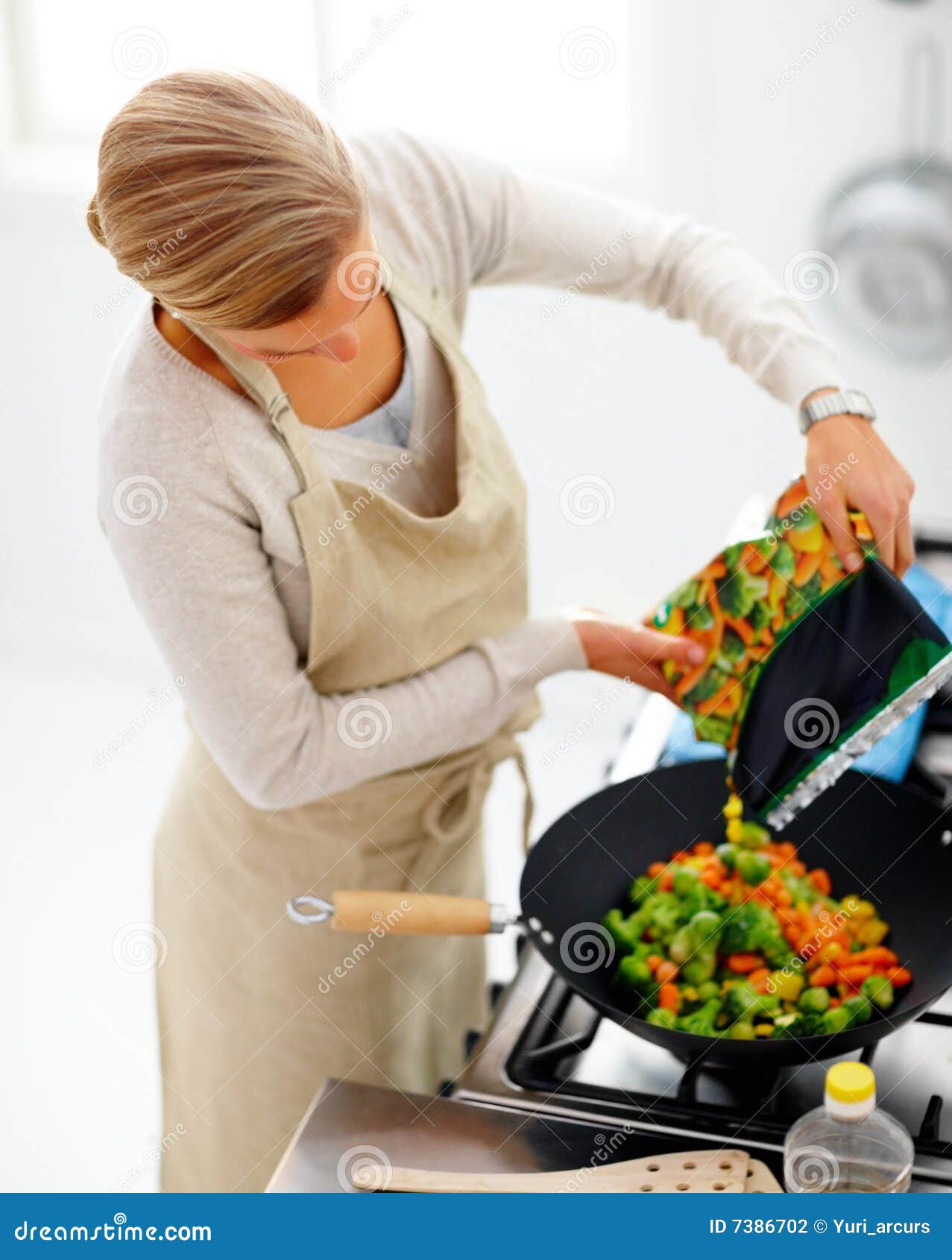 Busy Woman Cooking Vegetables in the Kitchen Stock Photo - Image of ...