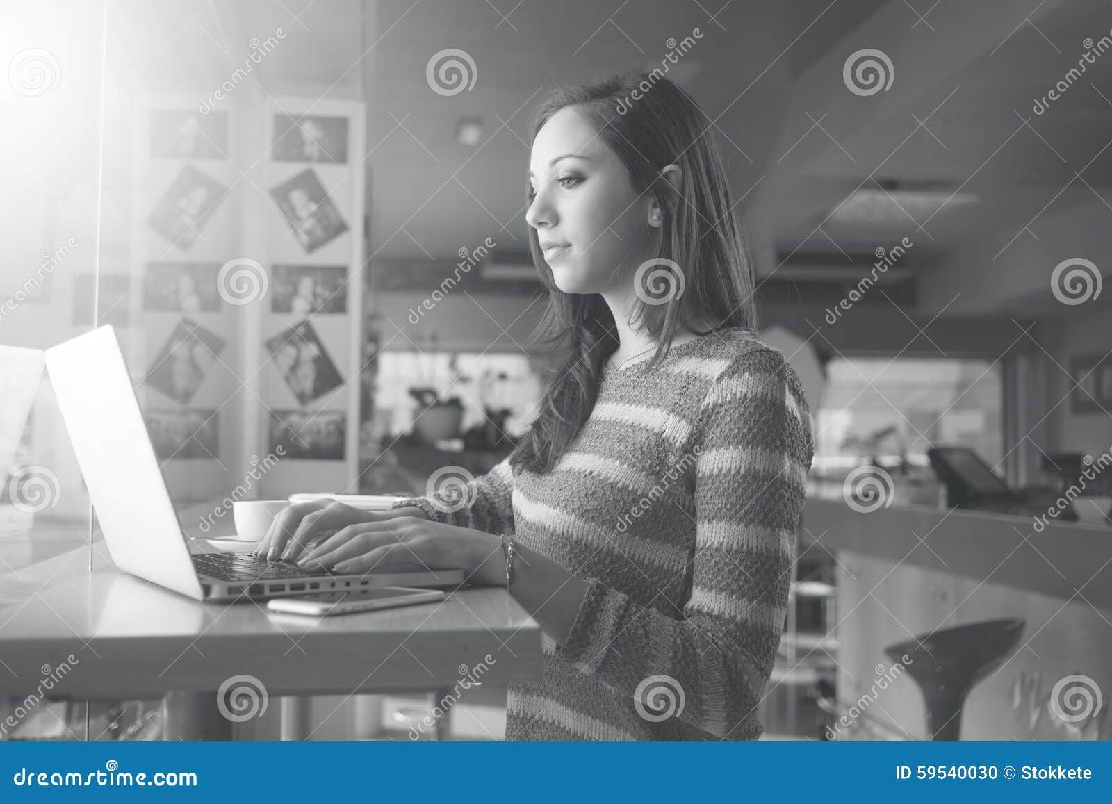 Busy woman using a laptop stock photo. Image of mobile - 59540030