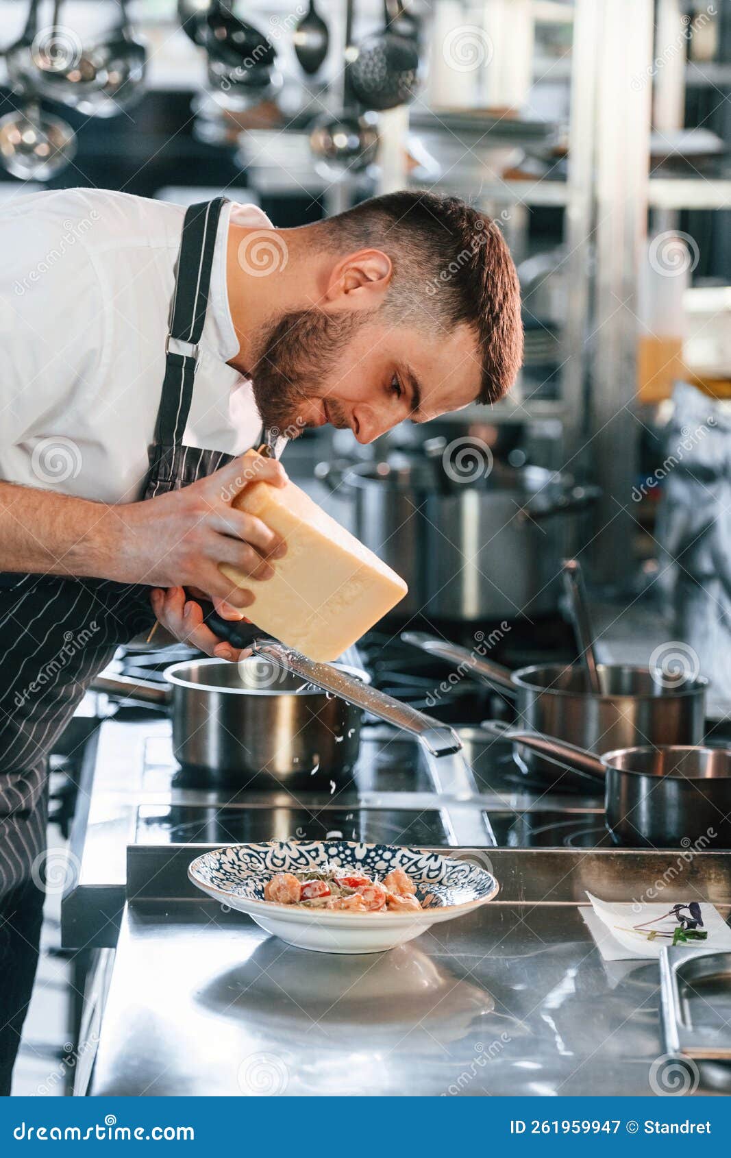 Busy at Work. Chef is on the Kitchen Preparing Food Stock Image - Image ...