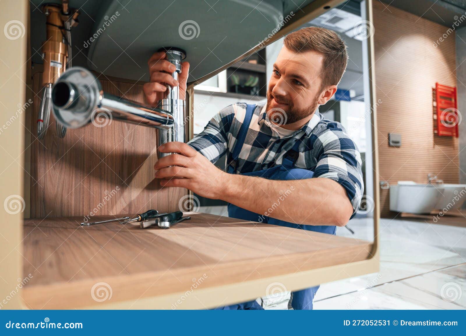 Busy Worker in Blue Uniform is in the Bathroom Stock Image - Image of ...