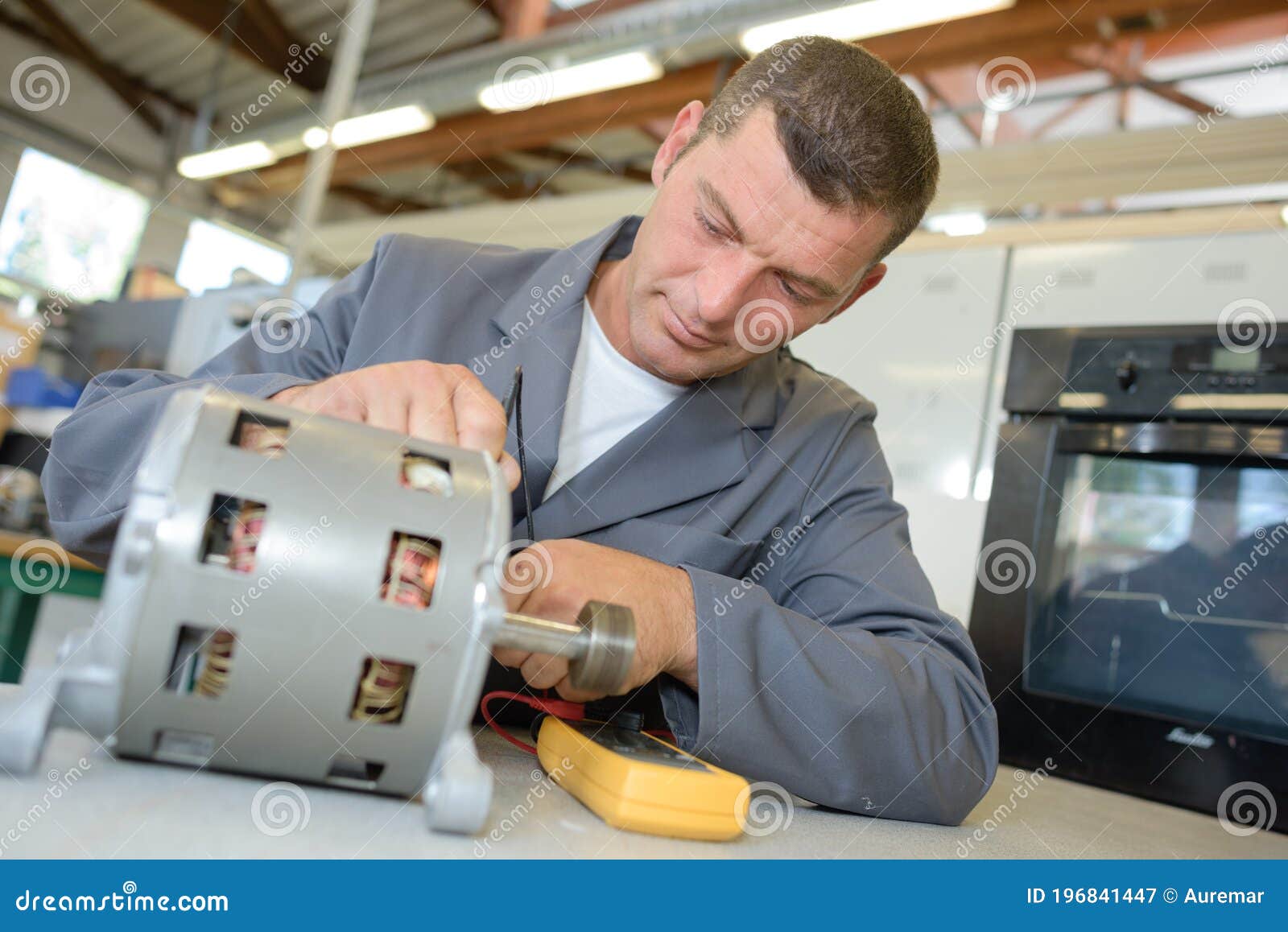Busy worker mechanic stock image. Image of container - 196841447