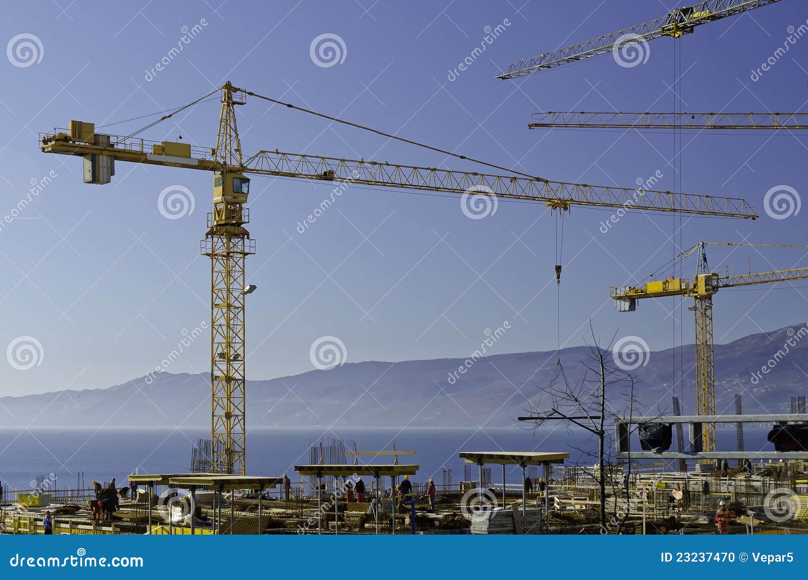 Busy Workers and Cranes at Construction Site Stock Photo - Image of ...