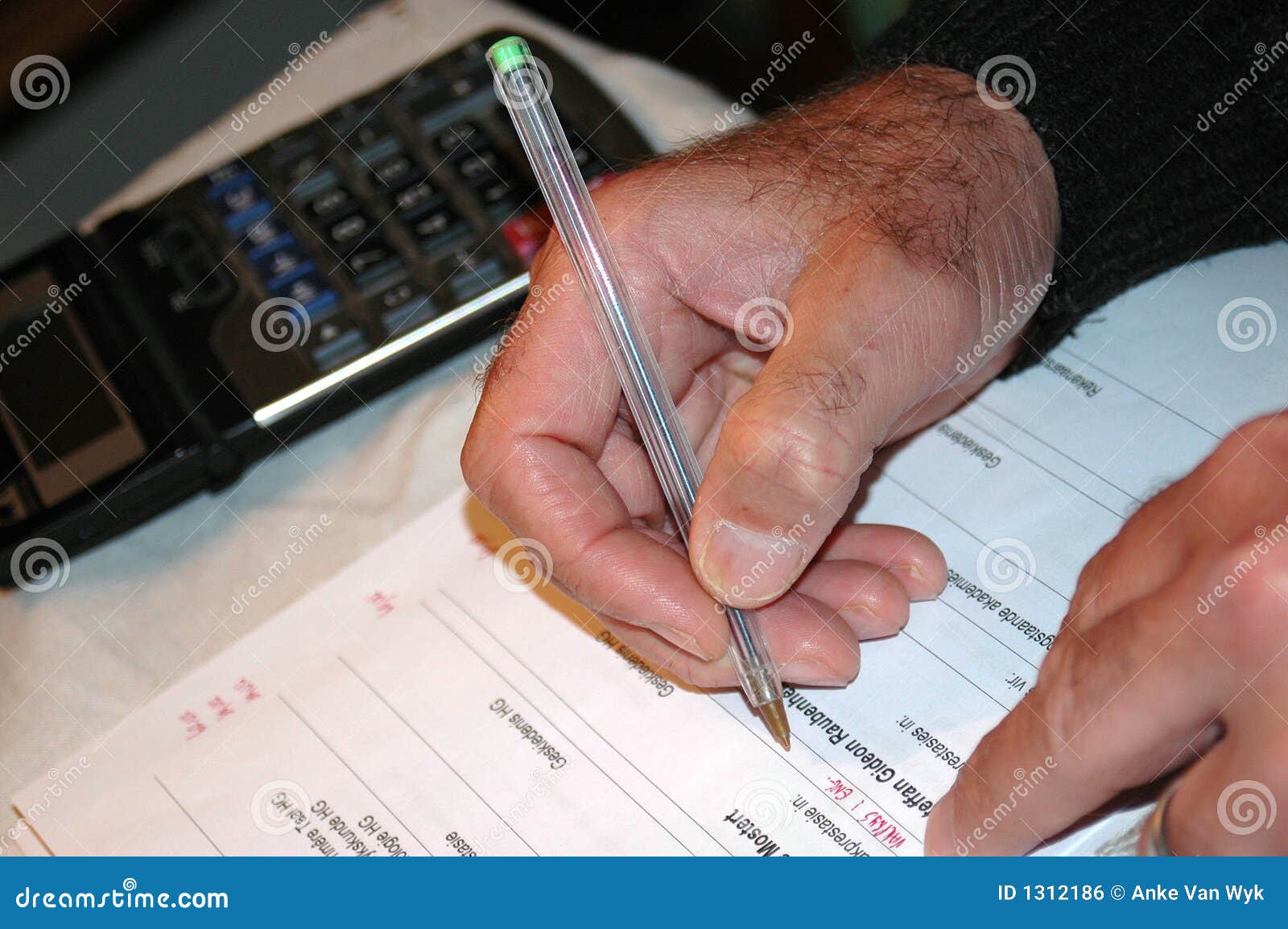 Busy writing at work stock photo. Image of educated, book - 1312186