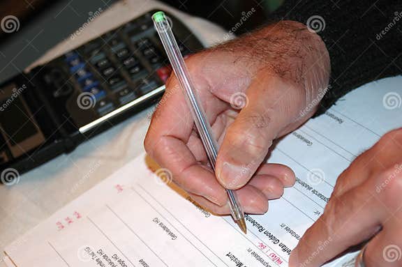 Busy writing at work stock photo. Image of educated, book - 1312186