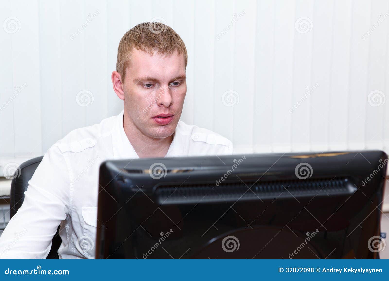 Busy Young Man in White Shirt Working at Pc Stock Photo - Image of ...