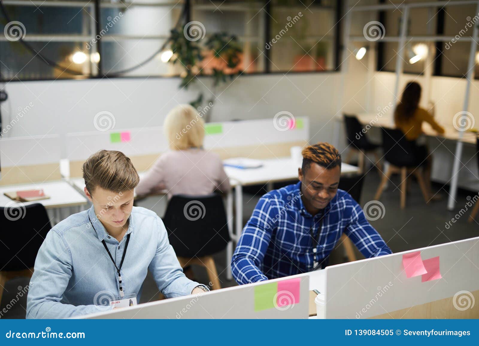 Busy young men at work stock image. Image of satisfied - 139084505