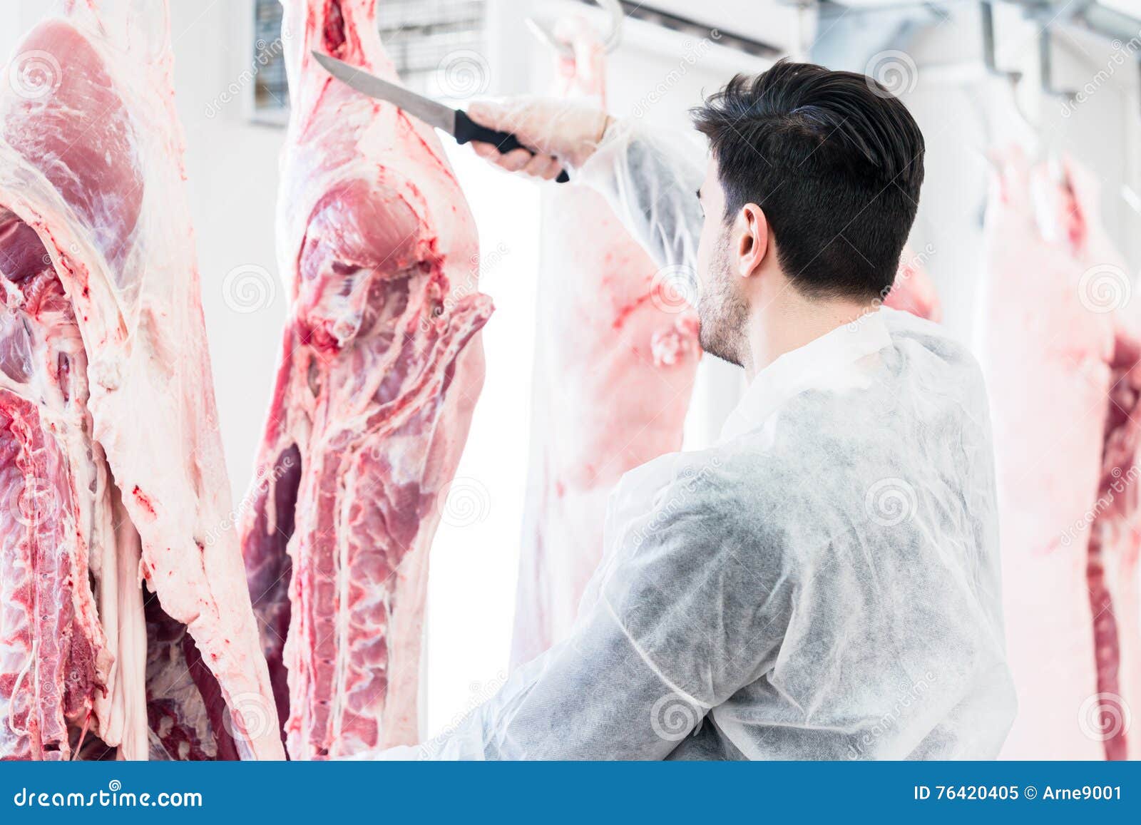 Butcher in Butchery or Slaughterhouse Cutting Meat Stock Image - Image ...