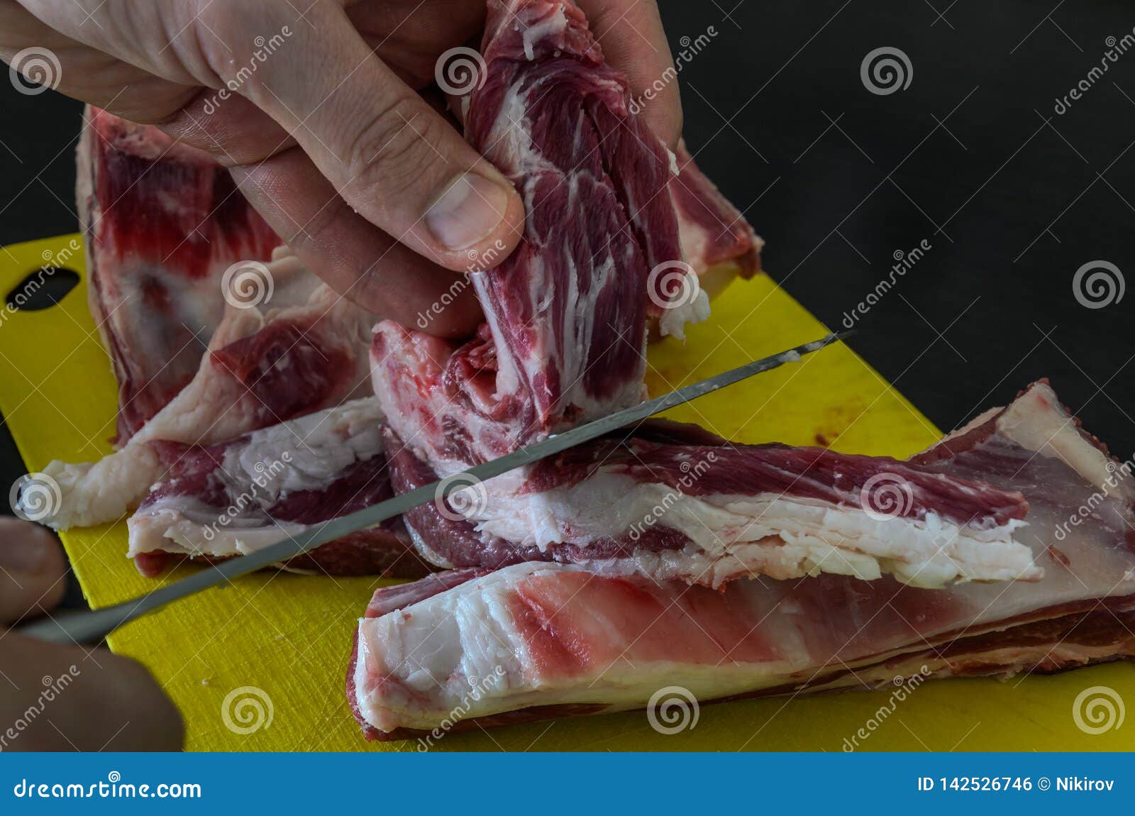 The Butcher Cuts the Lamb Meat on the Board Stock Photo - Image of beef ...