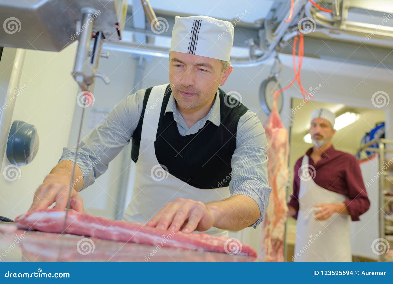 Butcher Cutting Meat with Fixed Blade Stock Photo - Image of steel ...