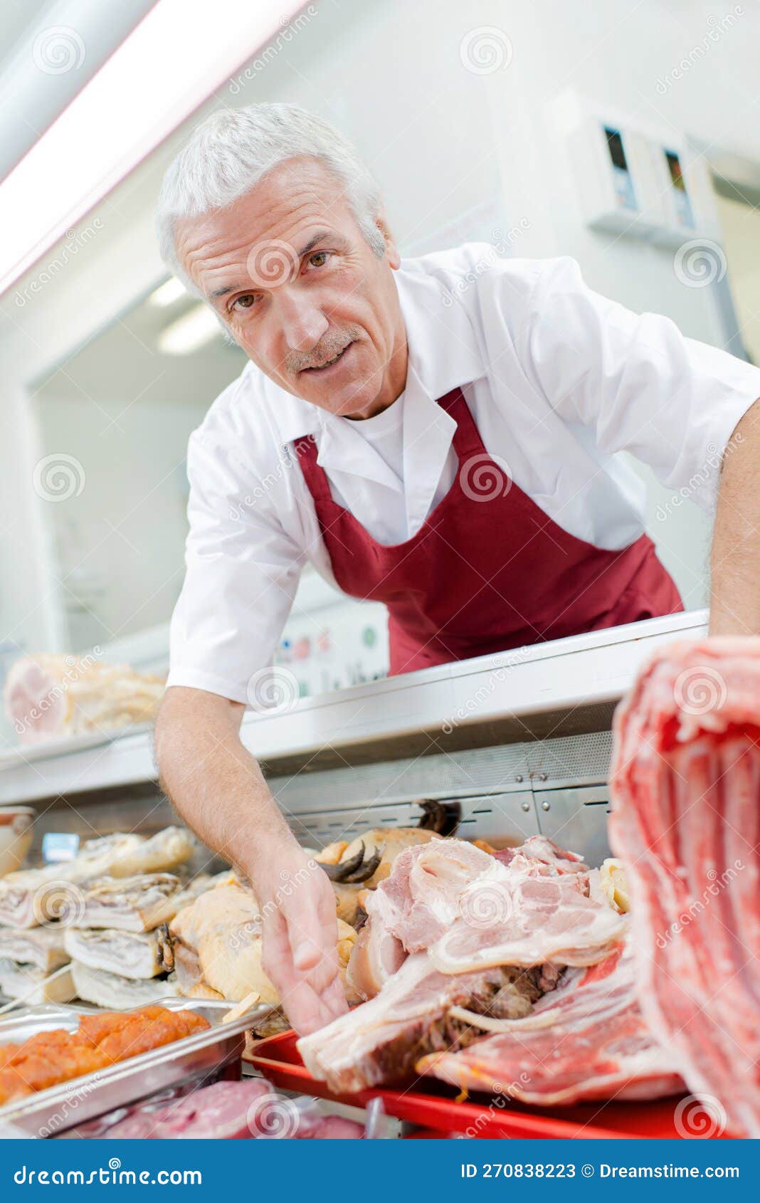 Butcher looking at camera stock image. Image of cattle - 270838223