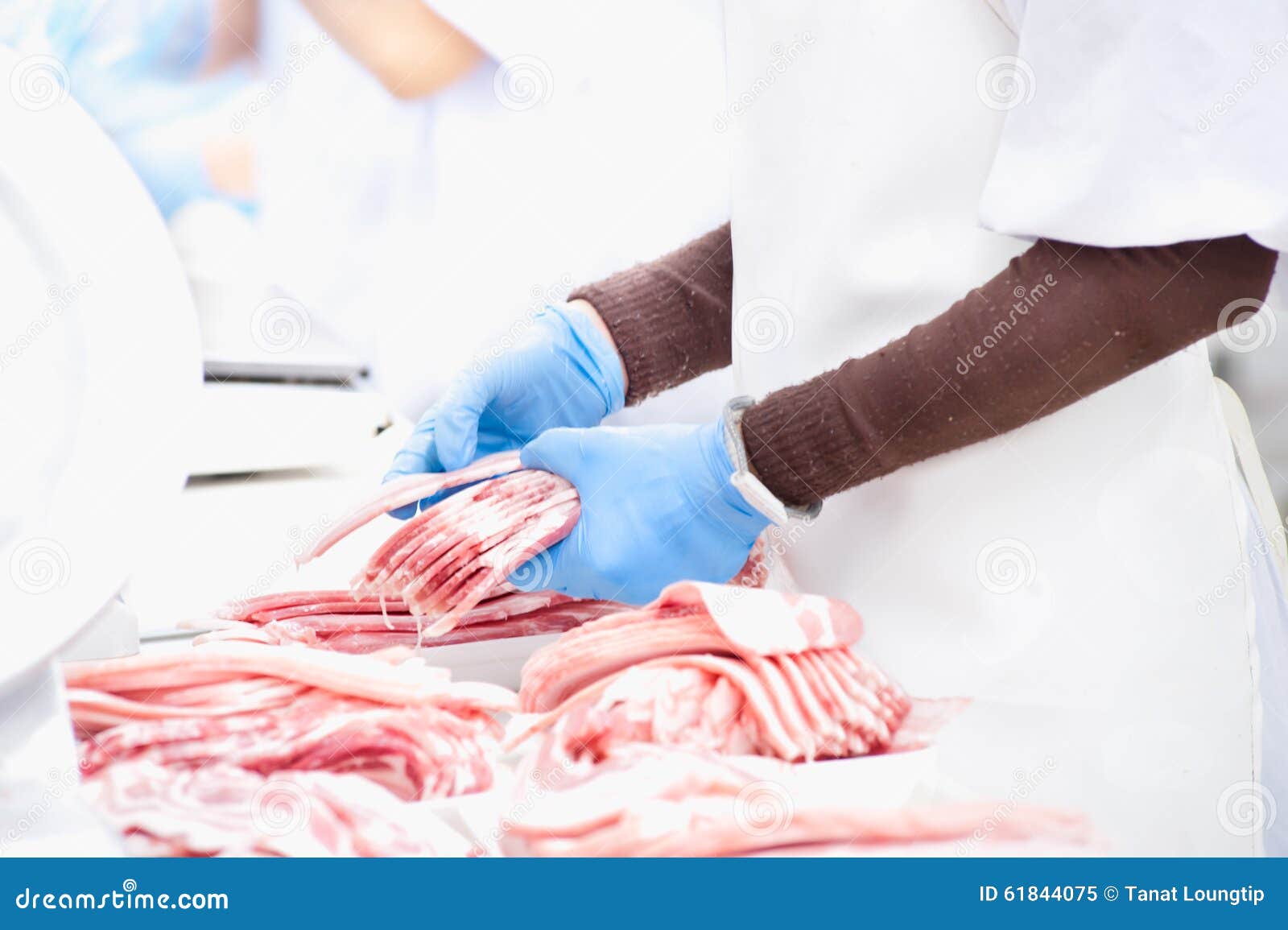 Butcher packing pork stock image. Image of clear, plastic - 61844075