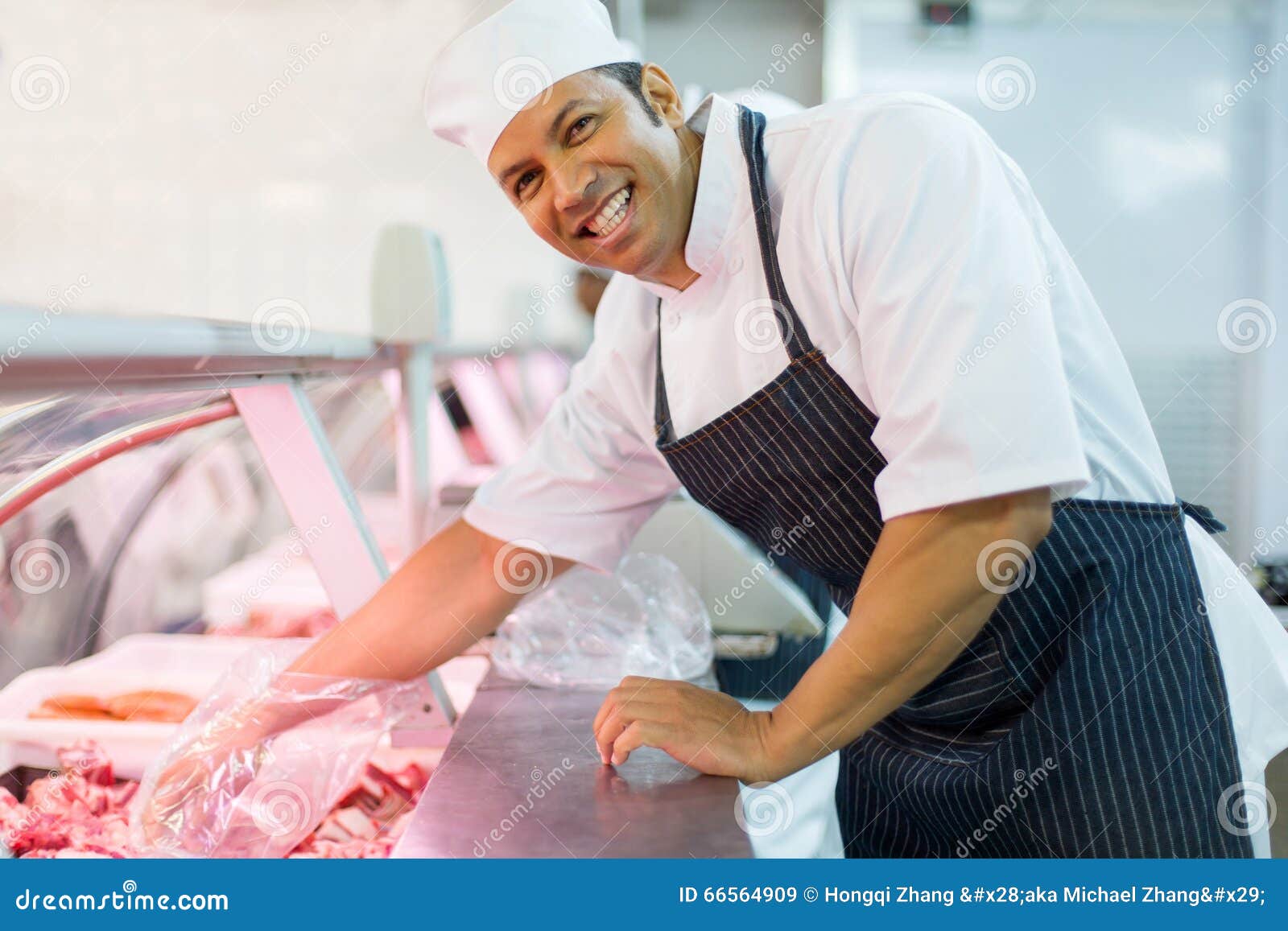 Butcher picking fresh meat stock image. Image of portrait - 66564909