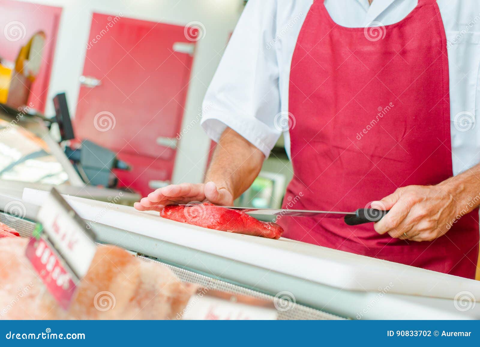 Butcher Preparing Cut Beef in Shop Stock Photo - Image of fleshy, flank ...