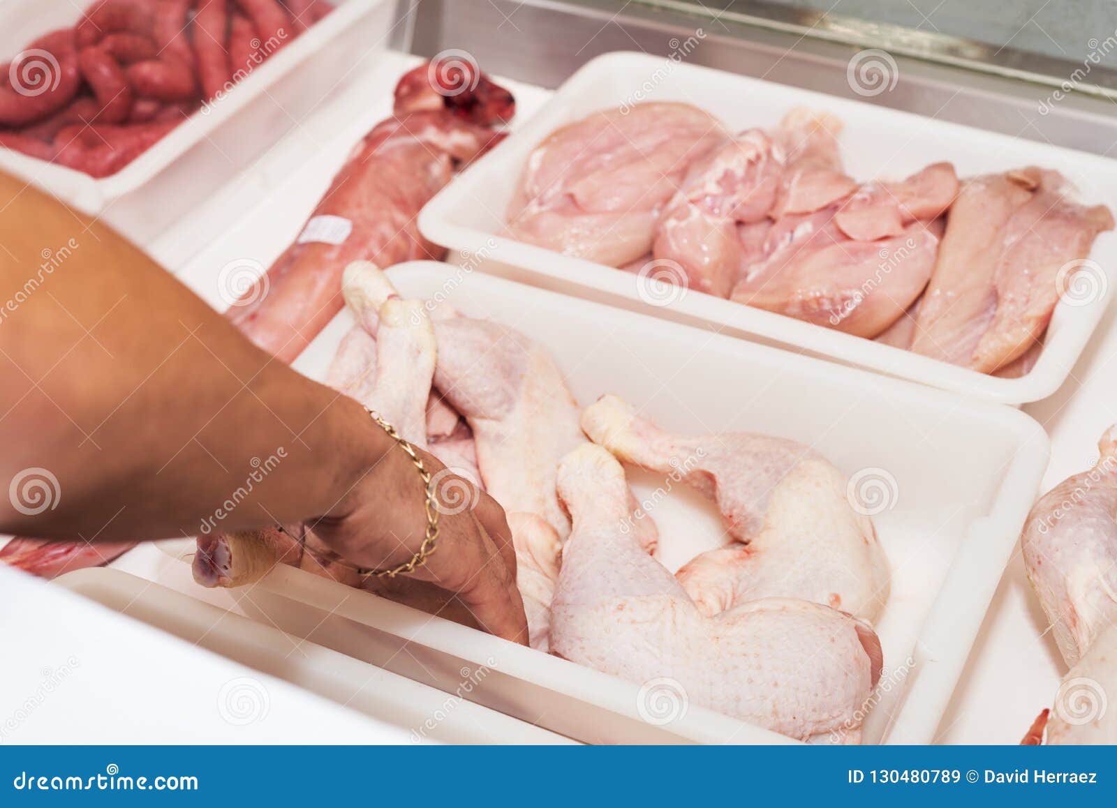 Butcher Serving Fresh Chicken Meat at Display in Butchery Stock Image ...