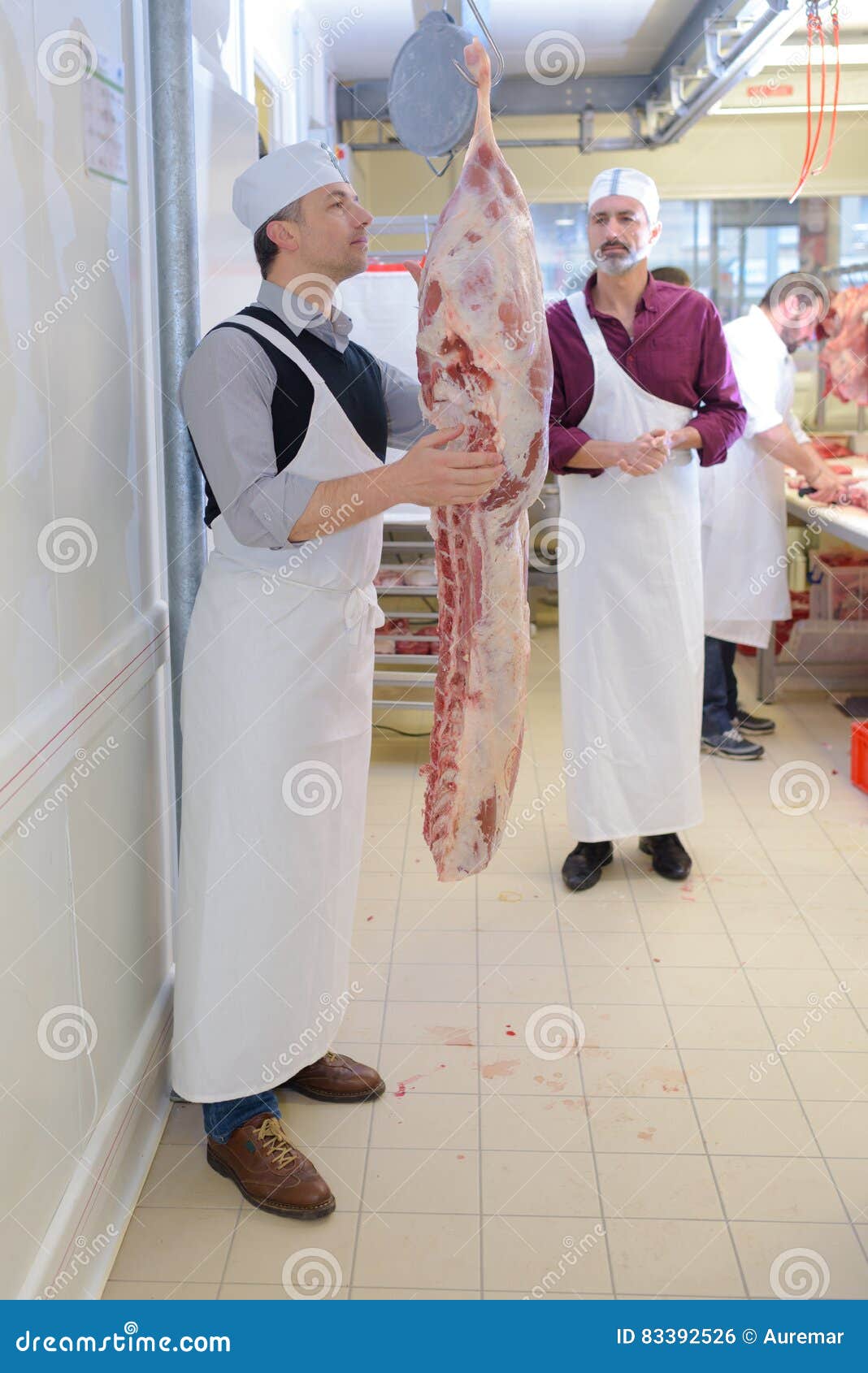 Butcher with side meat stock photo. Image of touching - 83392526