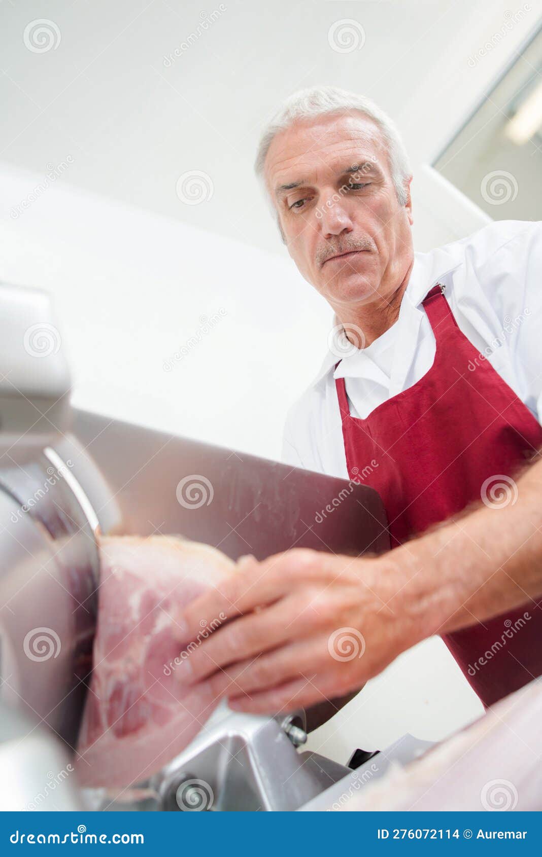 Butcher slicing ham stock photo. Image of slice, male - 276072114